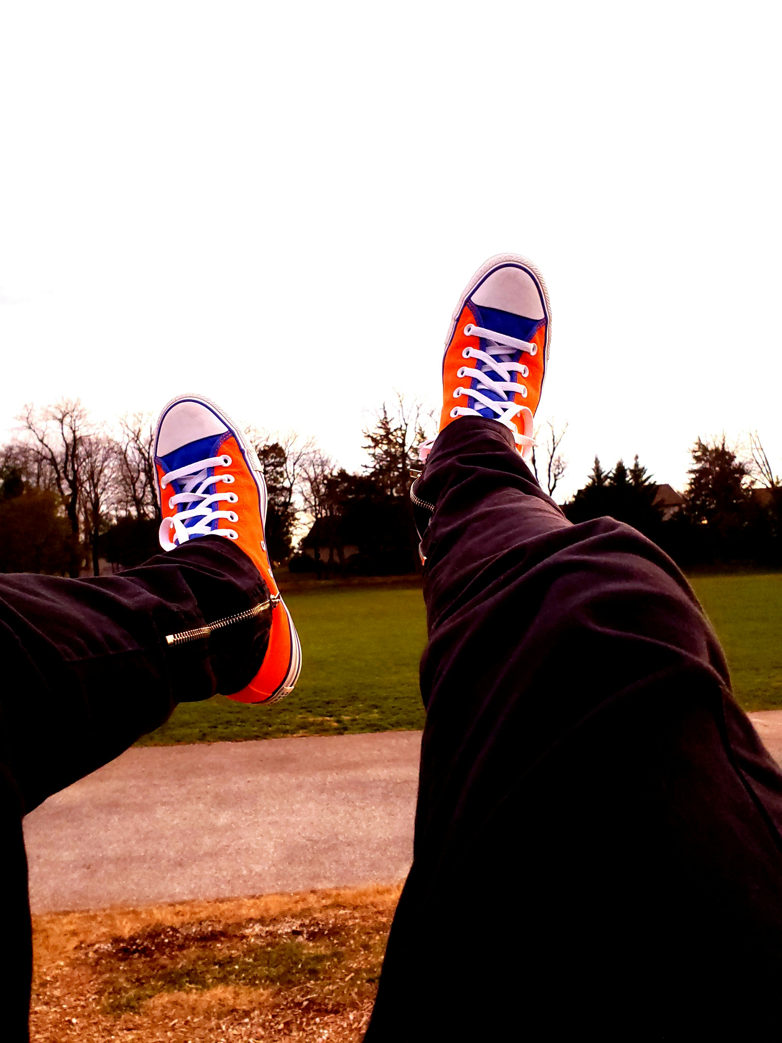 Leaning into the Sky: A Playful Perspective of Sneakers in Flight