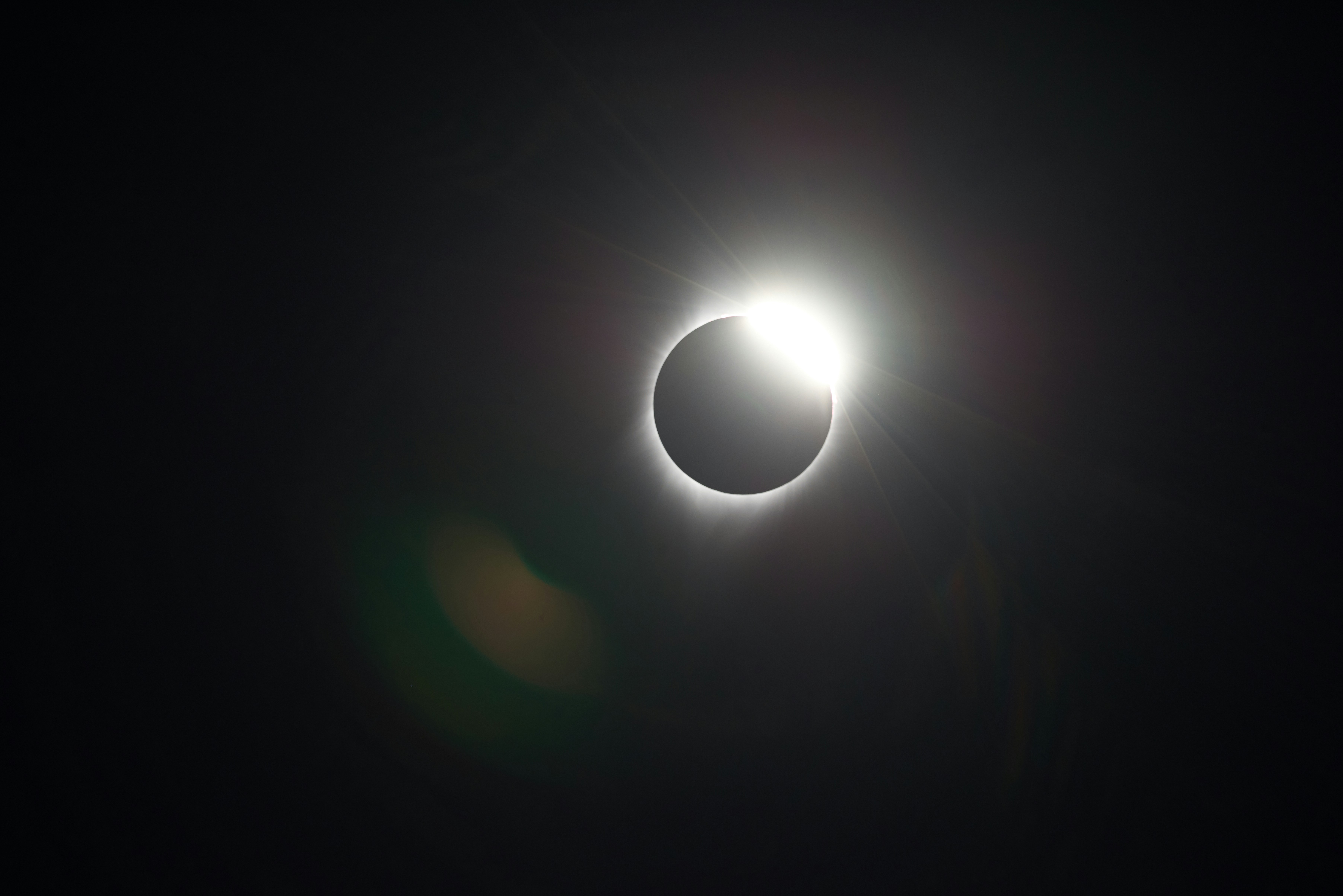 Diamond Ring | a solar eclipse is seen in the dark sky