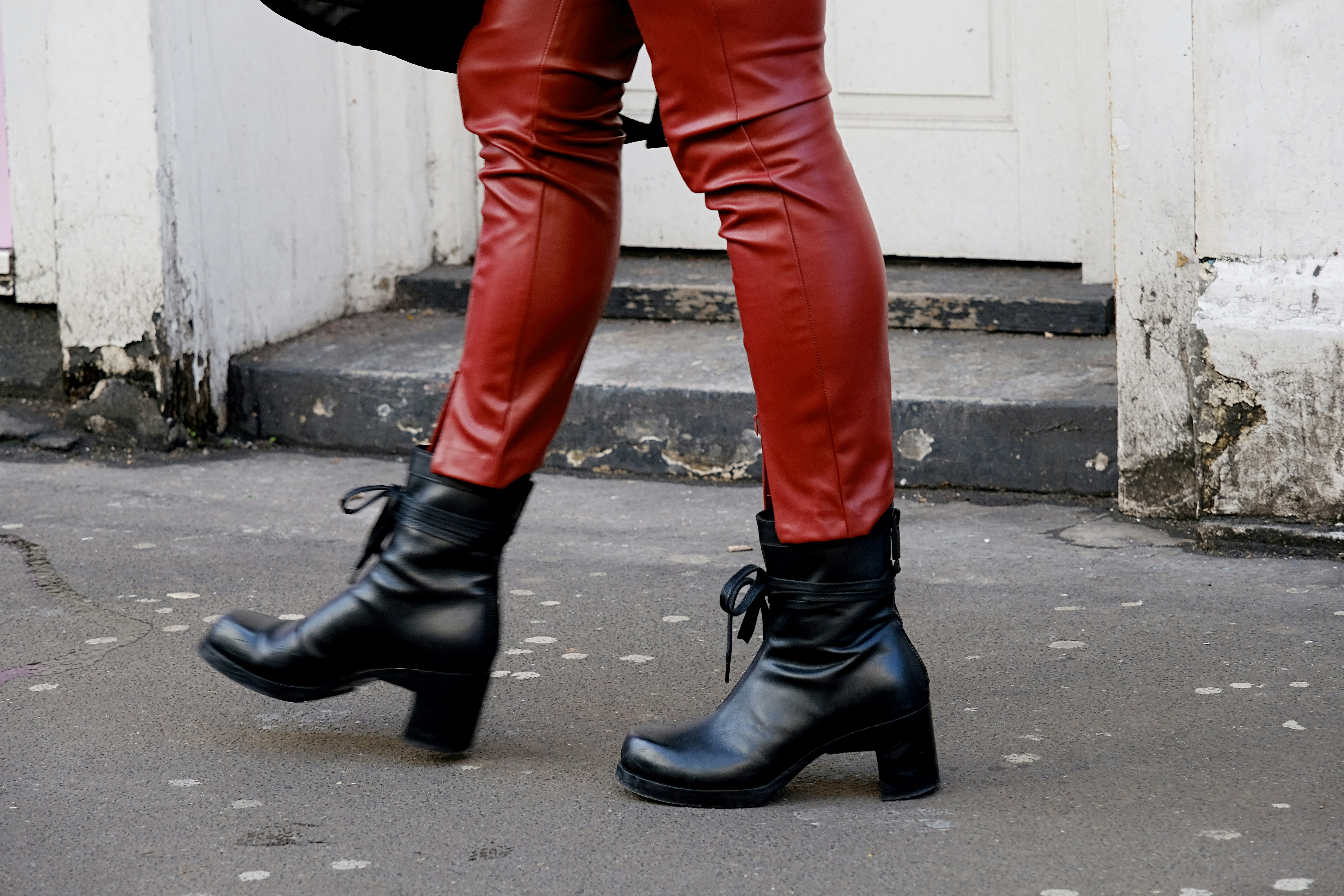 Pair of black leather boots photo – Free Human Image on Unsplash