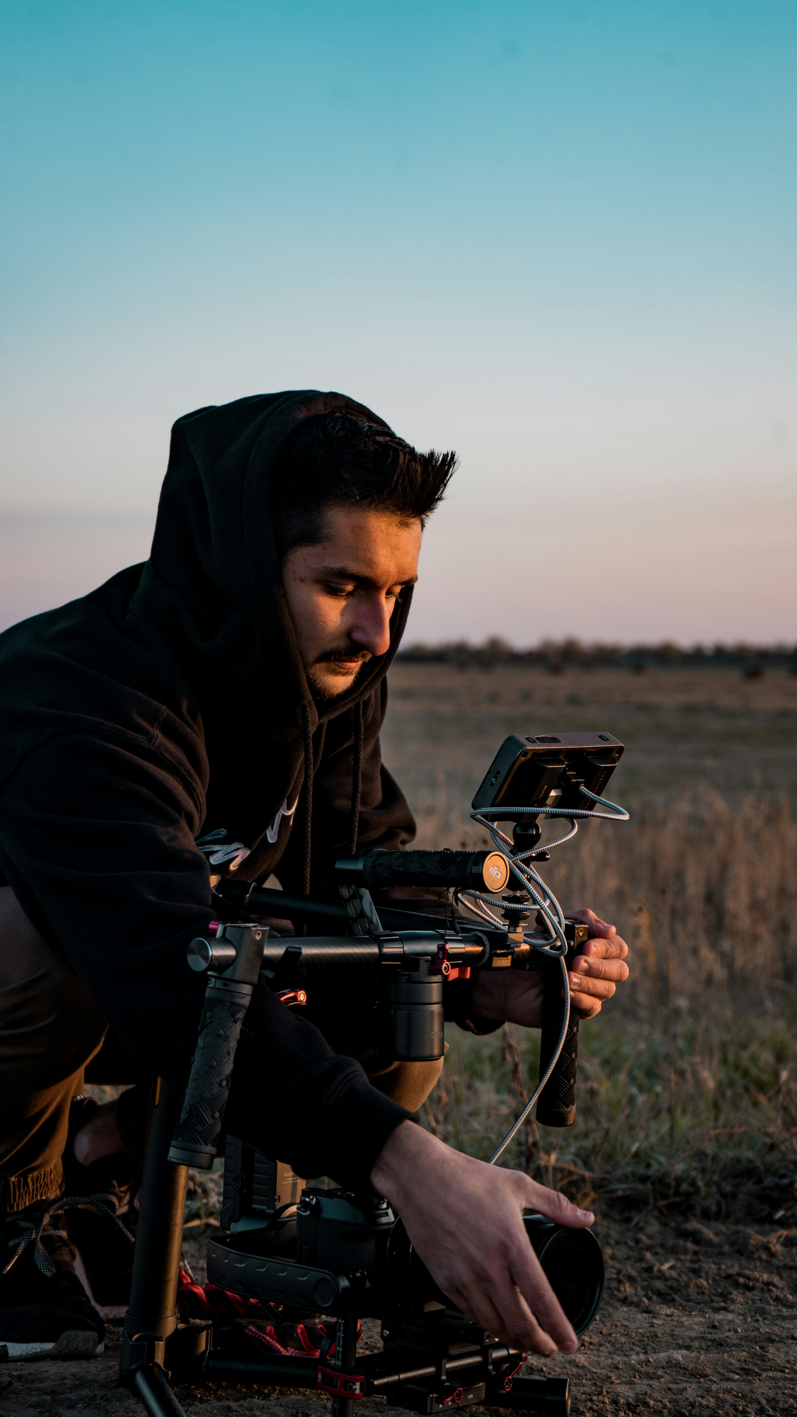Man holding gimbal photo – Free Canada Image on Unsplash