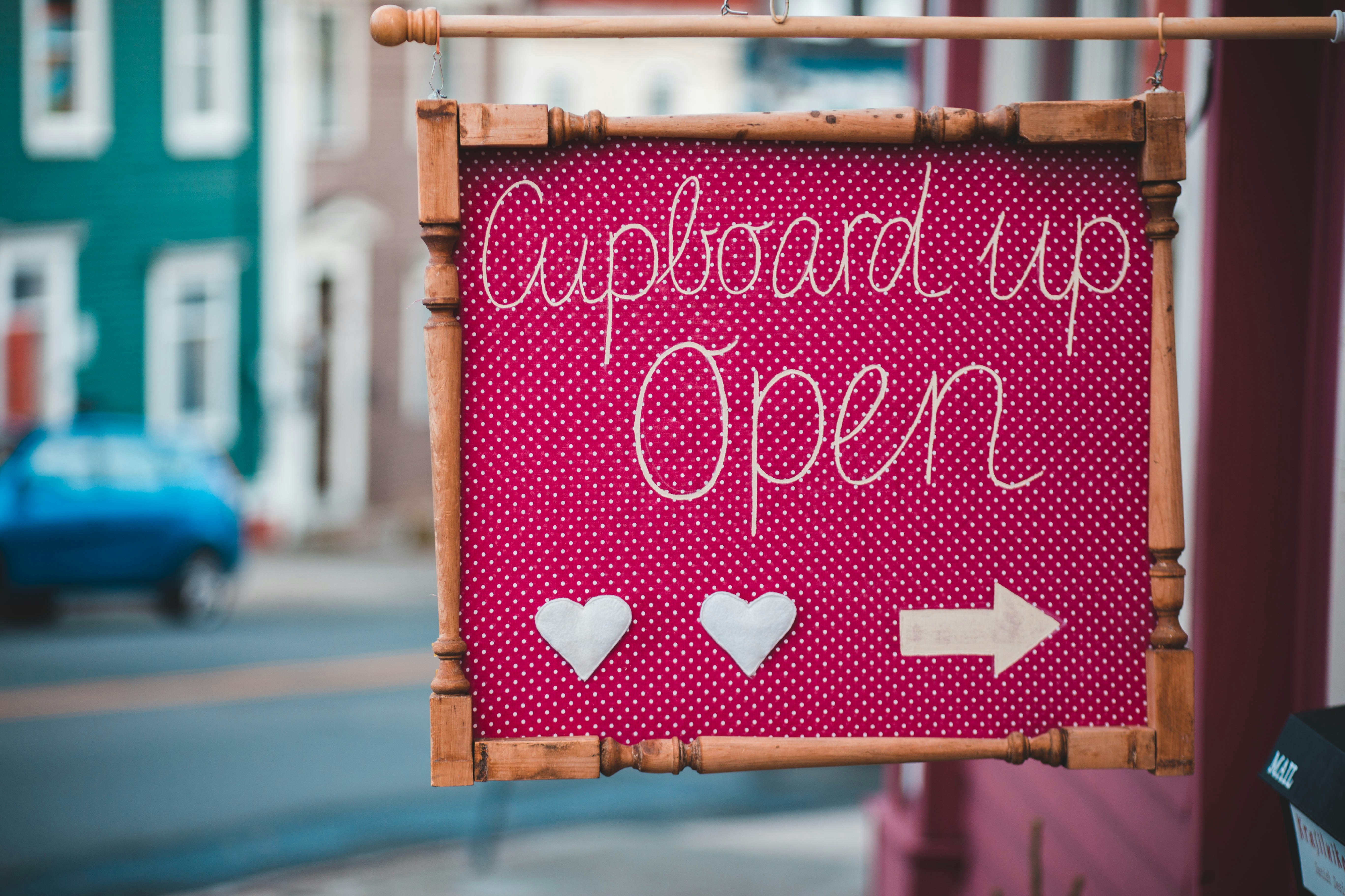 Open Sign, Open Hearts: A Whimsical Street Greeting