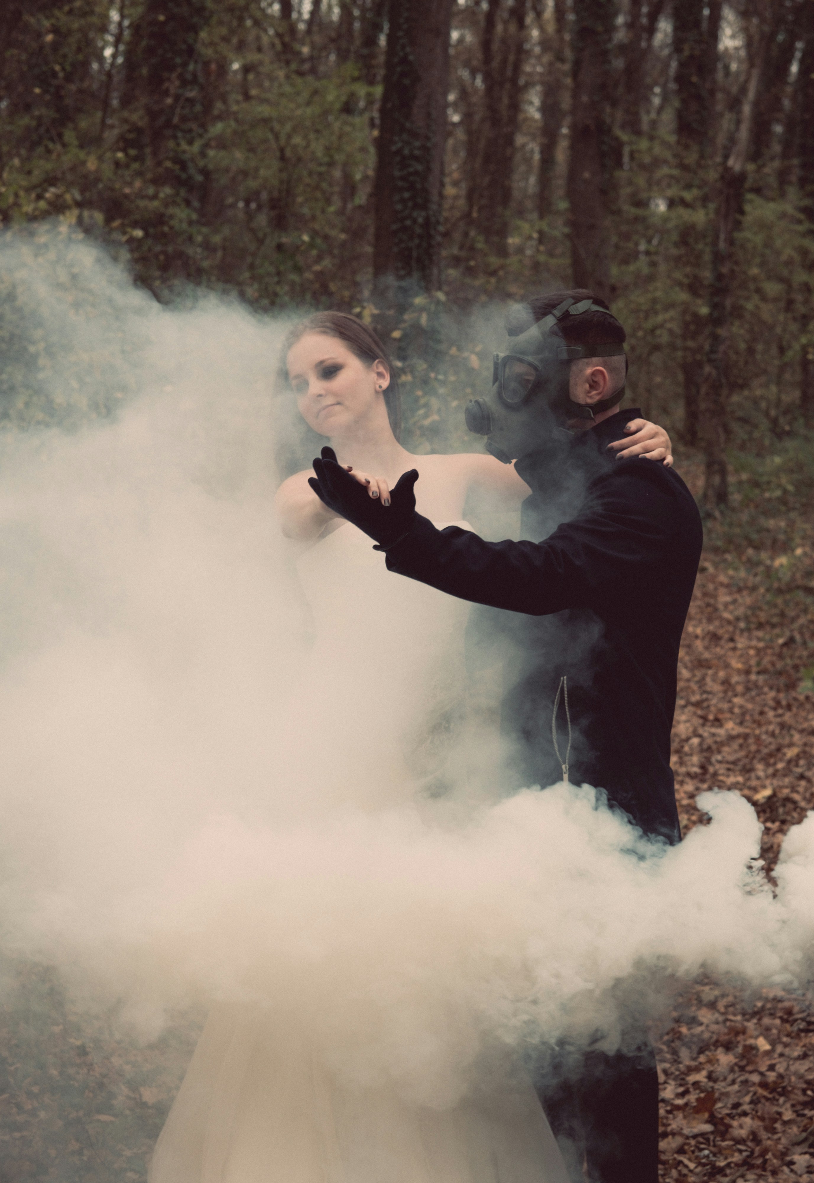 Smoke and Veil: A Bride and a Masked Guardian in the Dappled Woods