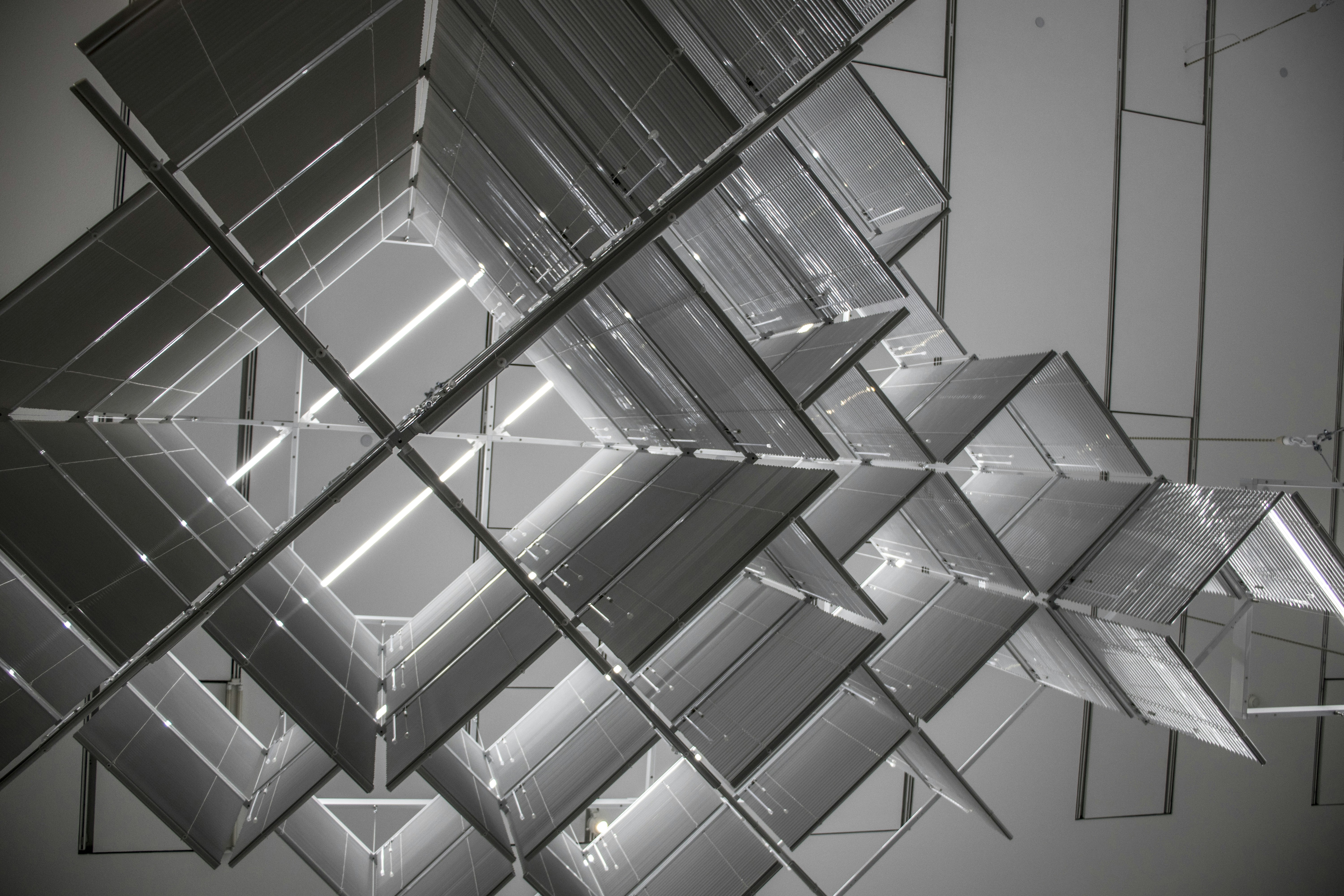 A very large metal structure with lots of windows photo – Free Grey ...