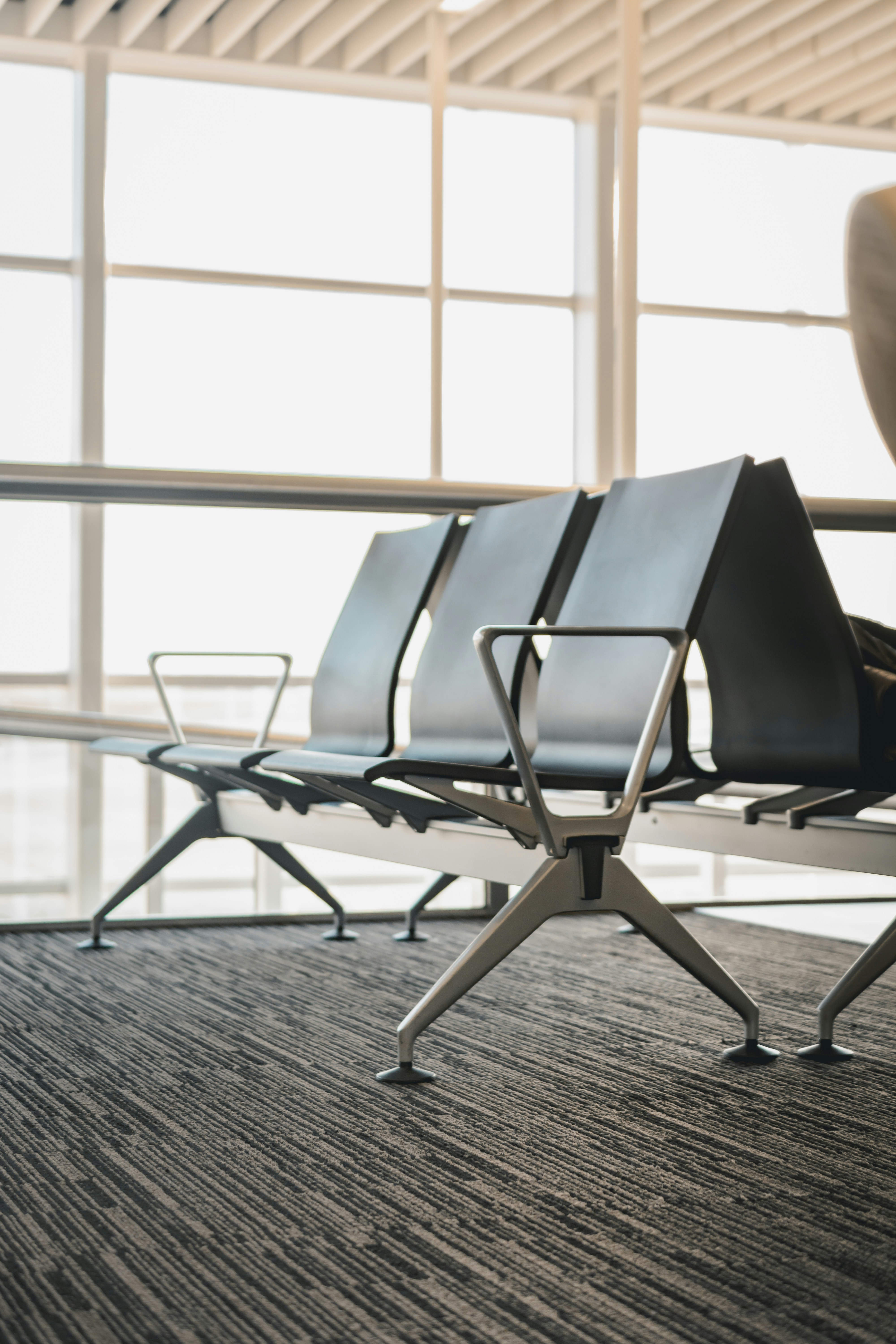 Vacant gray waiting chair photo – Free Grey Image on Unsplash