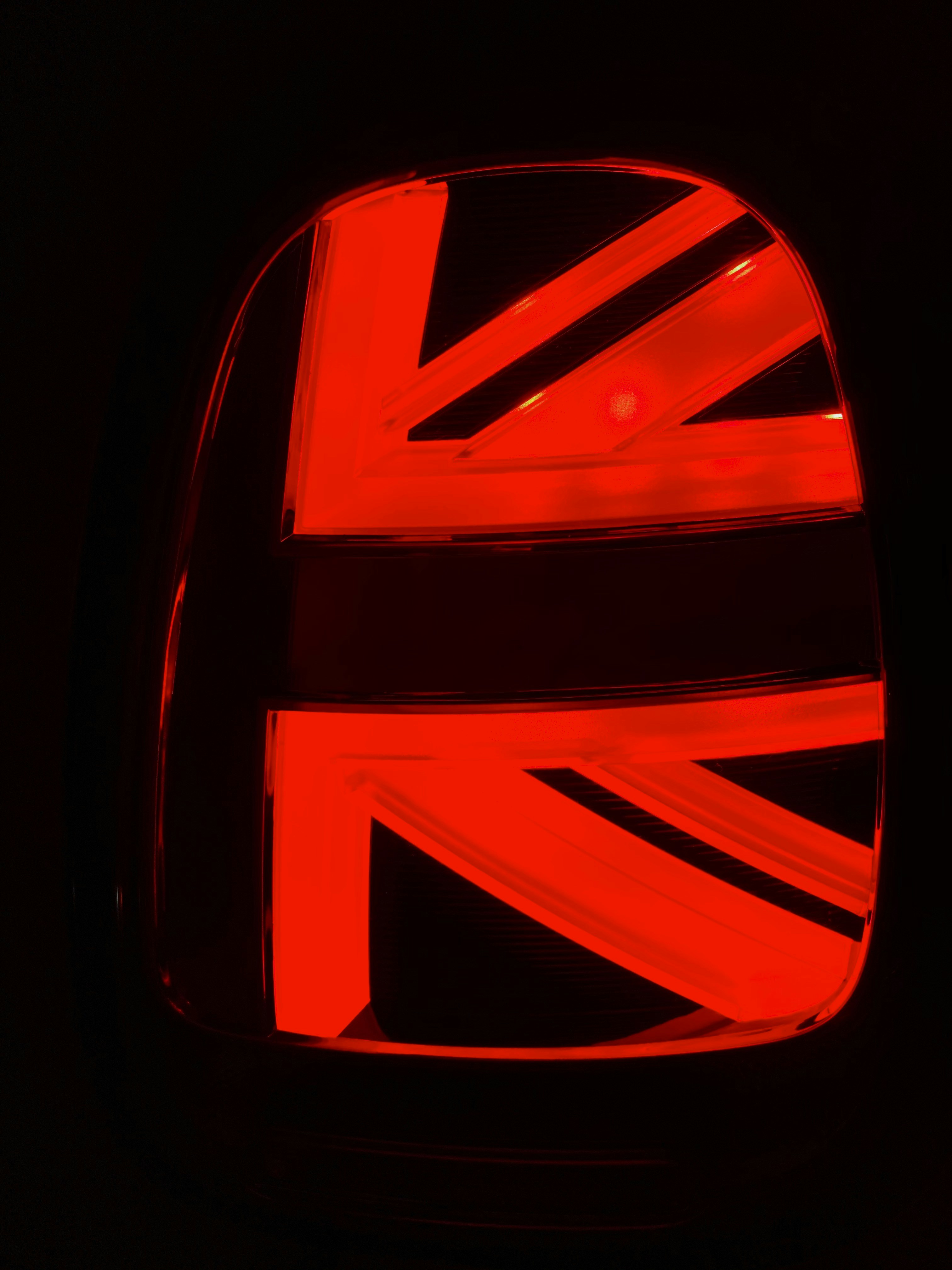 A car emblem with the british flag painted on it photo – Free Red Image ...