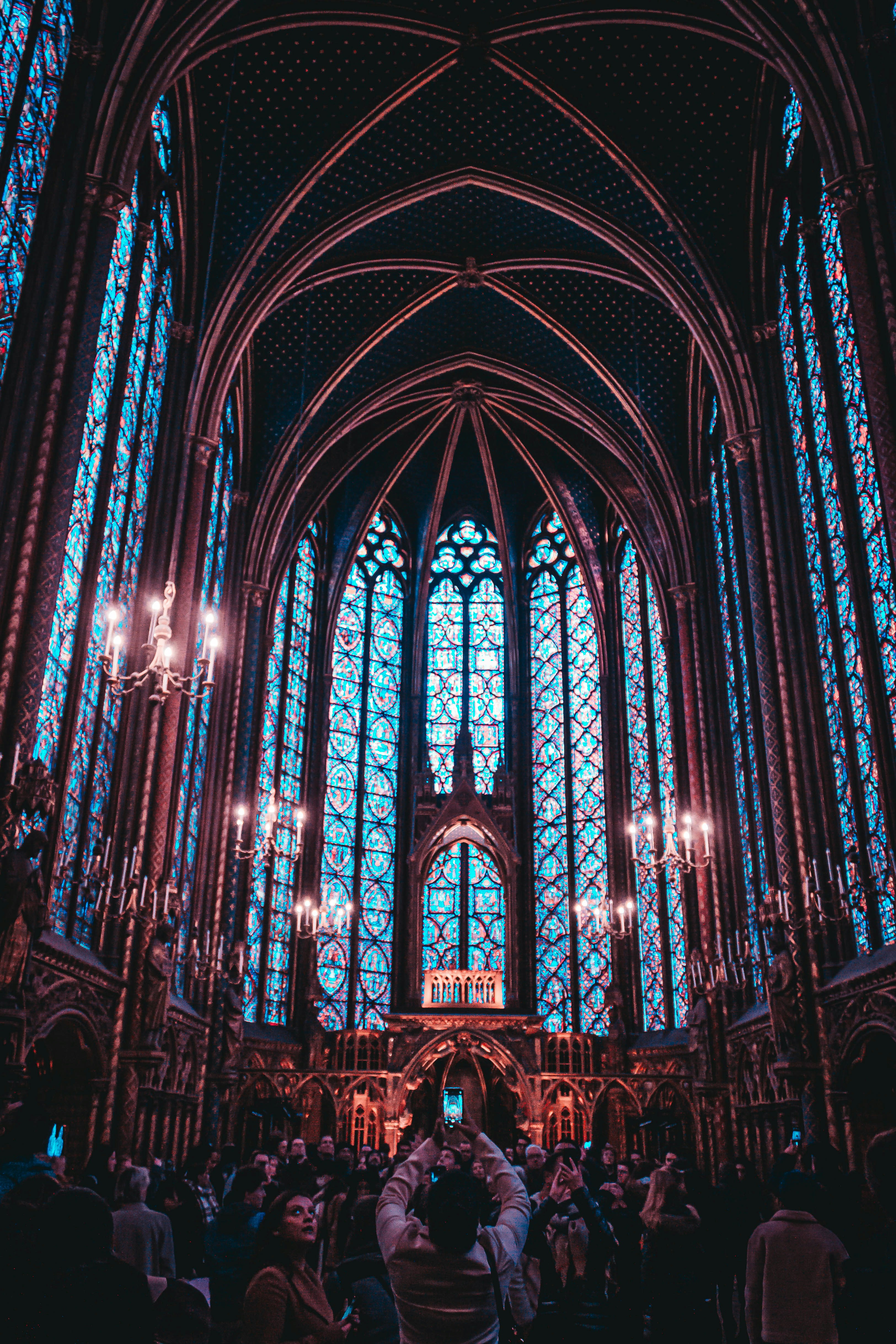 Blue Vault of the Gothic Nave: Crowds Beneath Stained Glass Arches