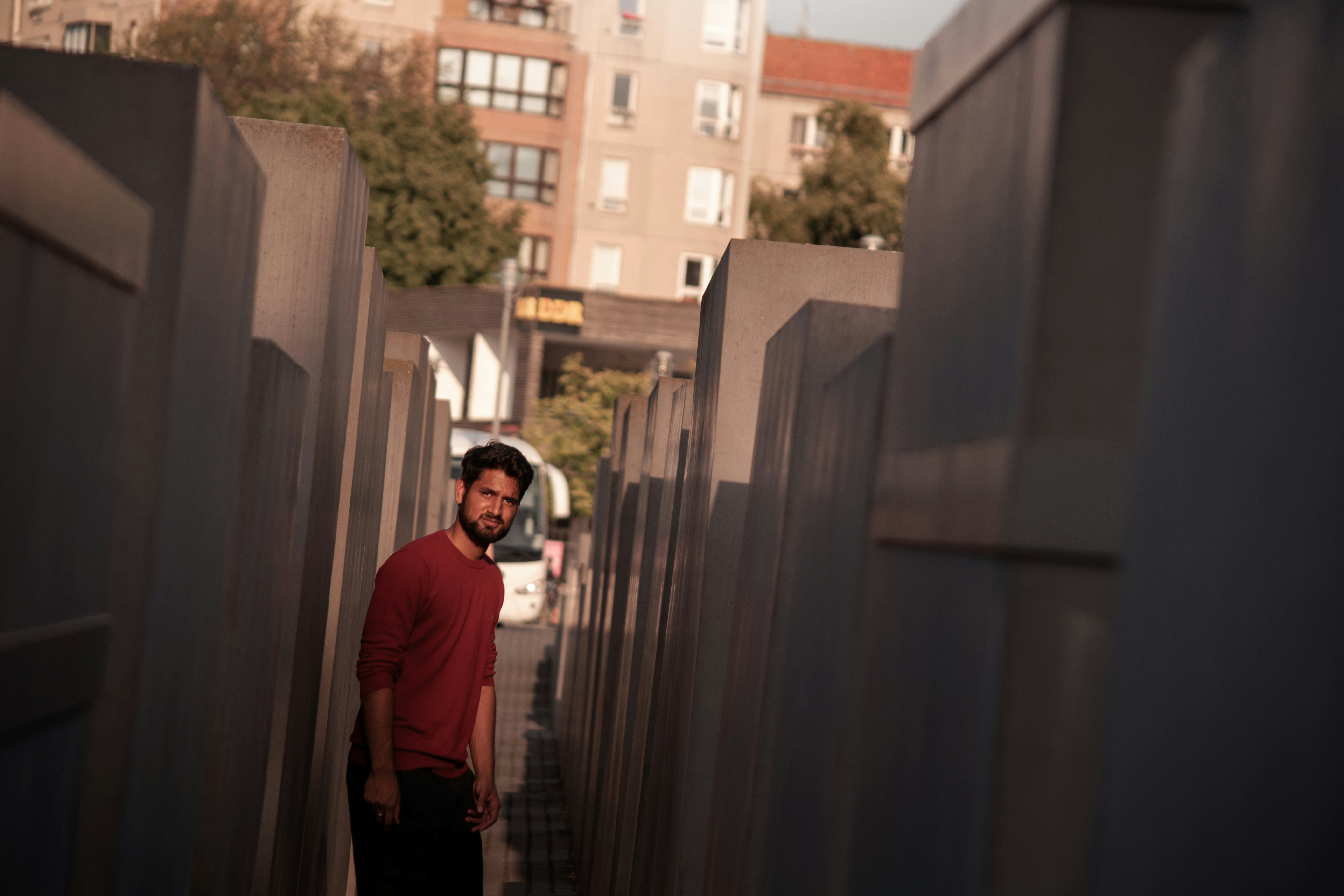Man standing between walls photo – Free Portrait Image on Unsplash