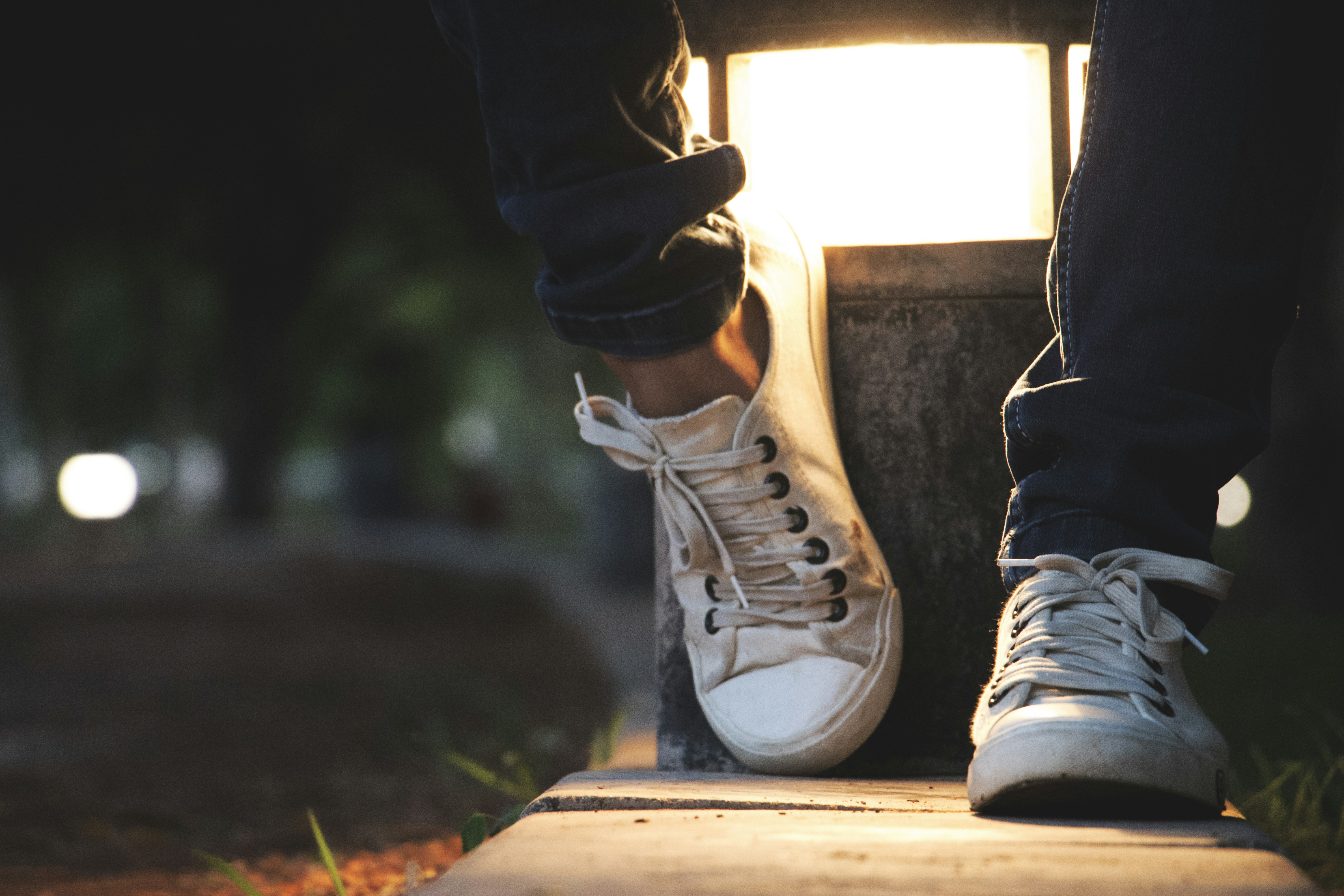 pair of white low-top sneakers