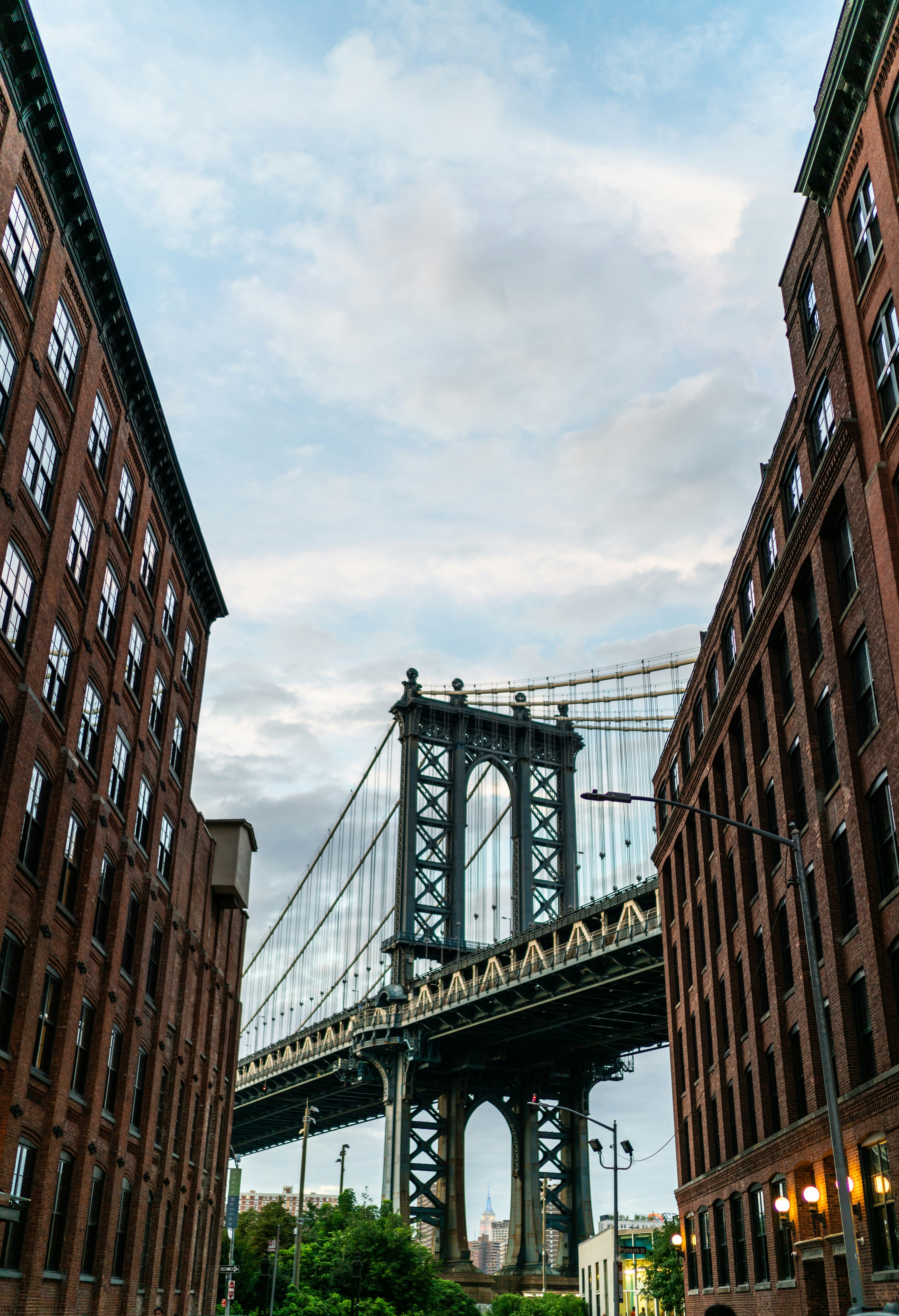 Bridge Between Two Brick Walls: A Cityscape Frame with Manhattan Skyline