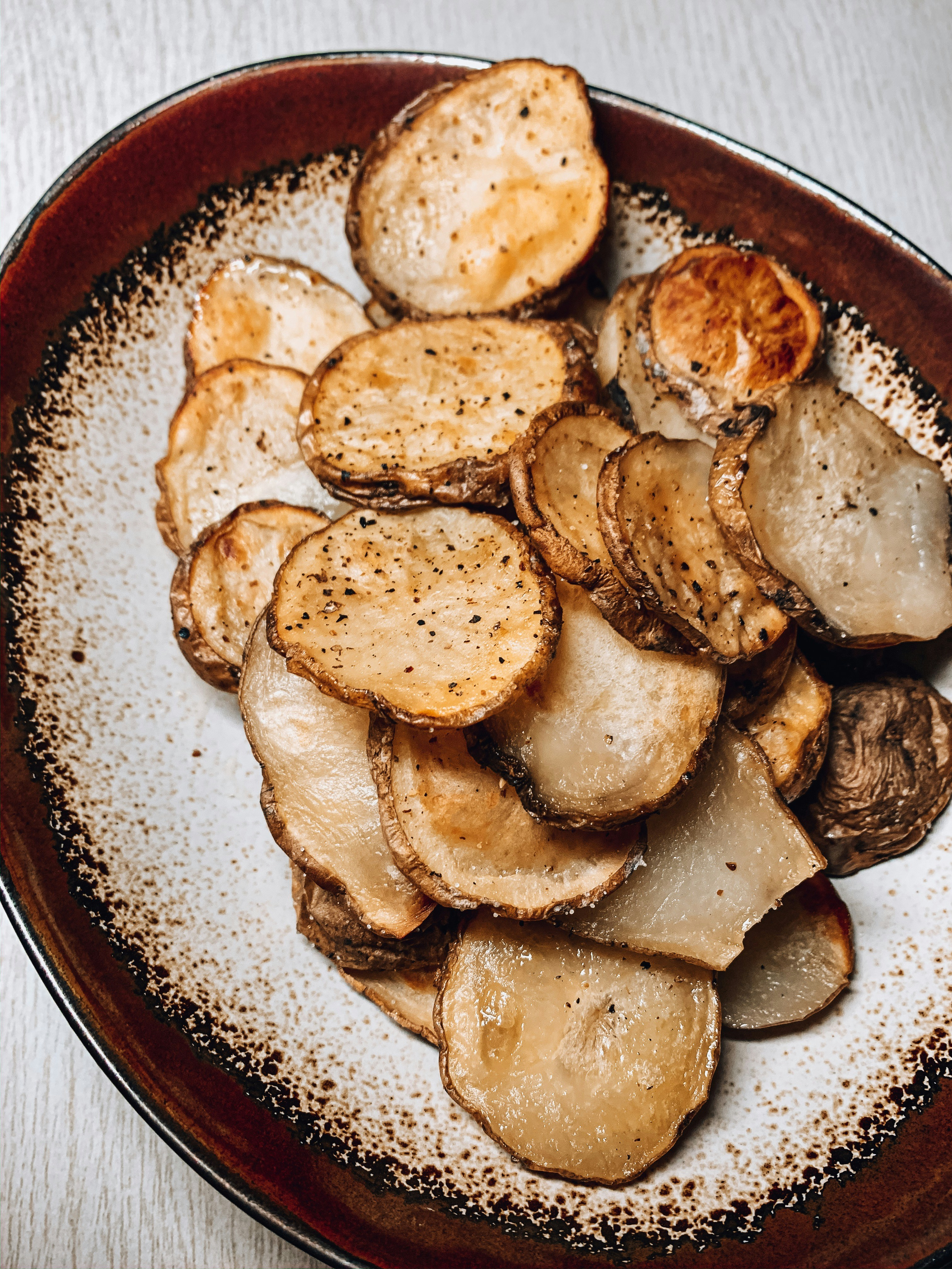 Crisped Potatoes: A Rustic Plate of Roasted Slices
