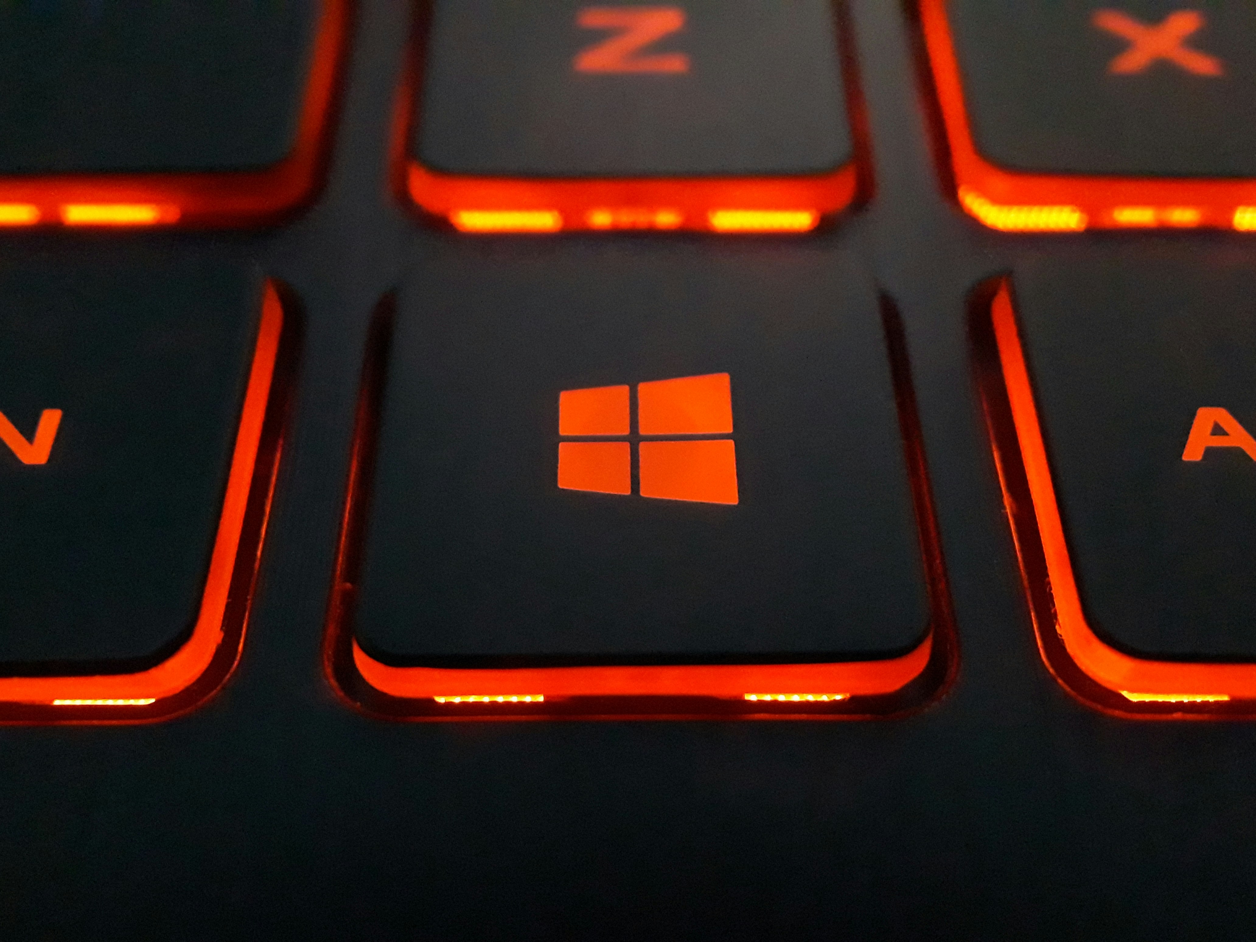 Microsoft button with red light keyboard photo – Free Red Image on Unsplash