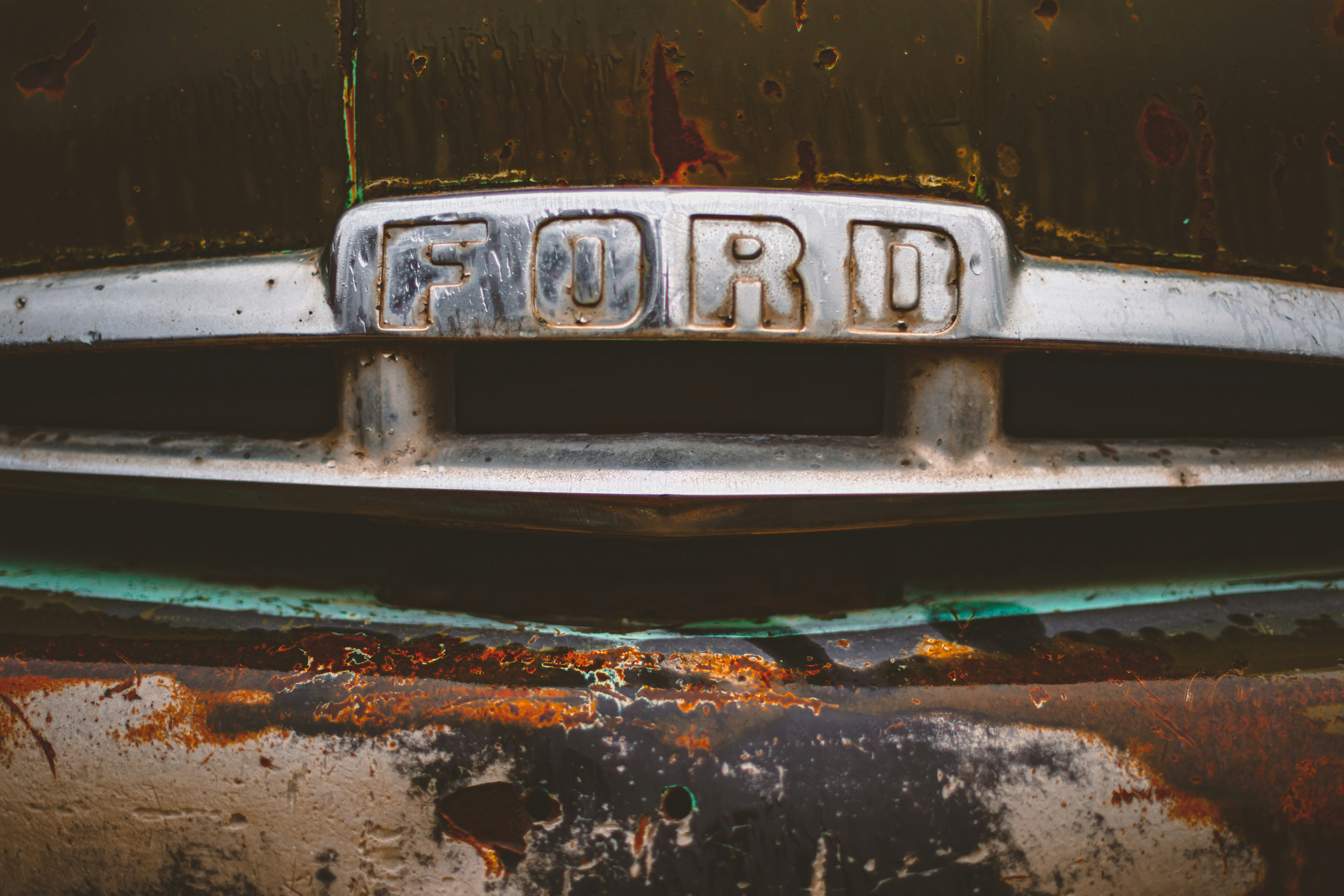 a close up of the front of an old car