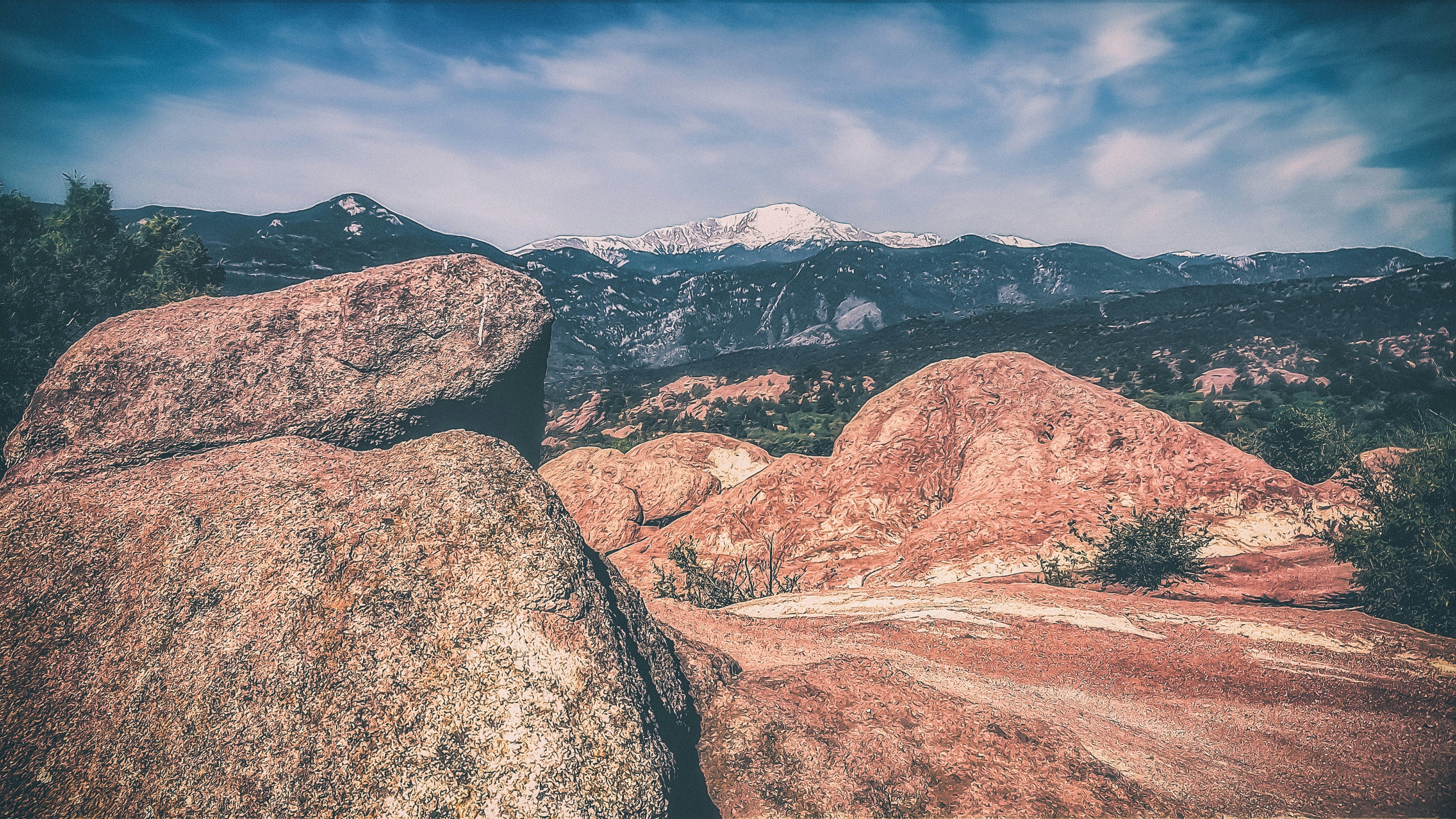 Photography of rock formation and mountain range during daytime photo ...