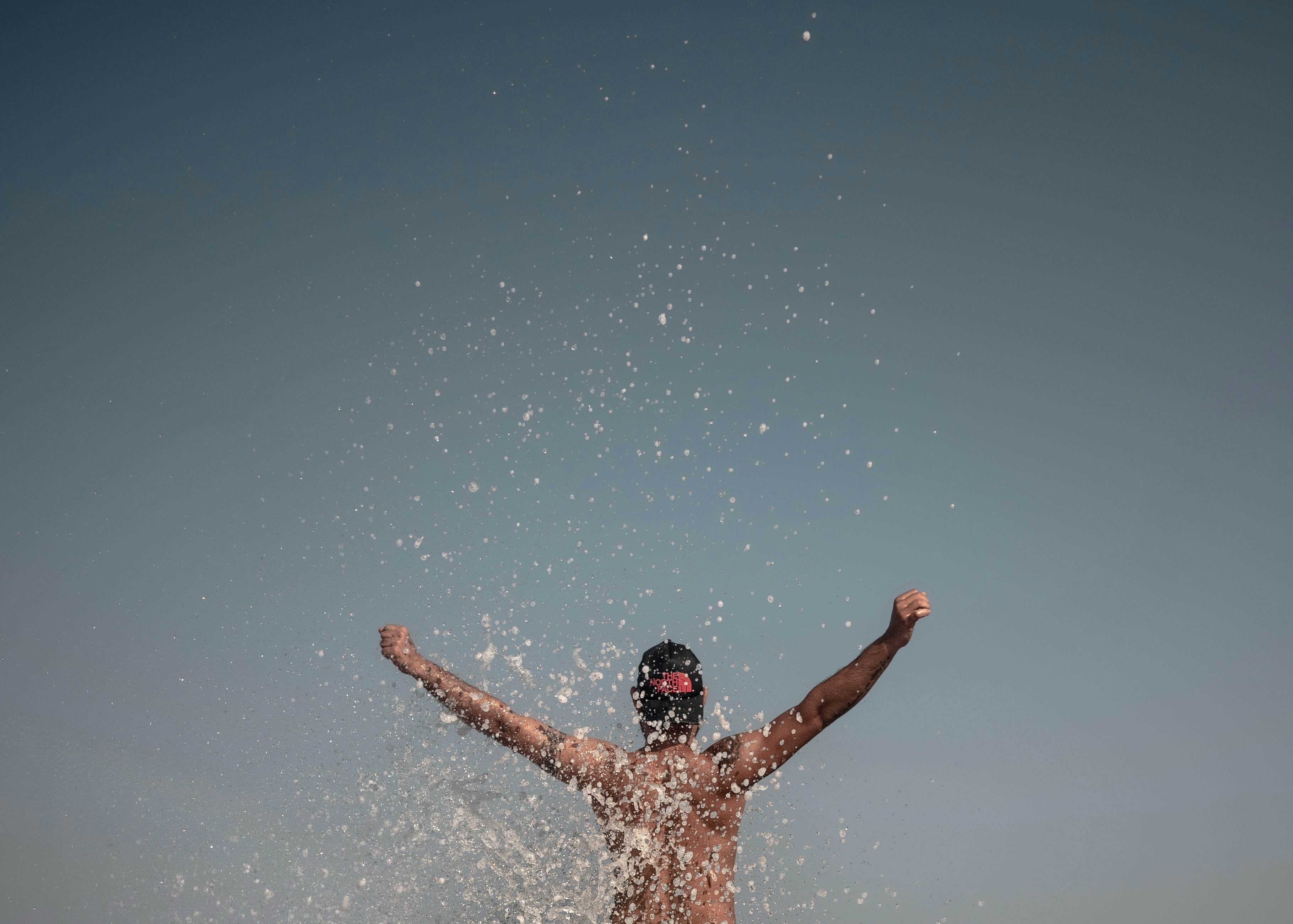 Man splashing water photo – Free Human Image on Unsplash
