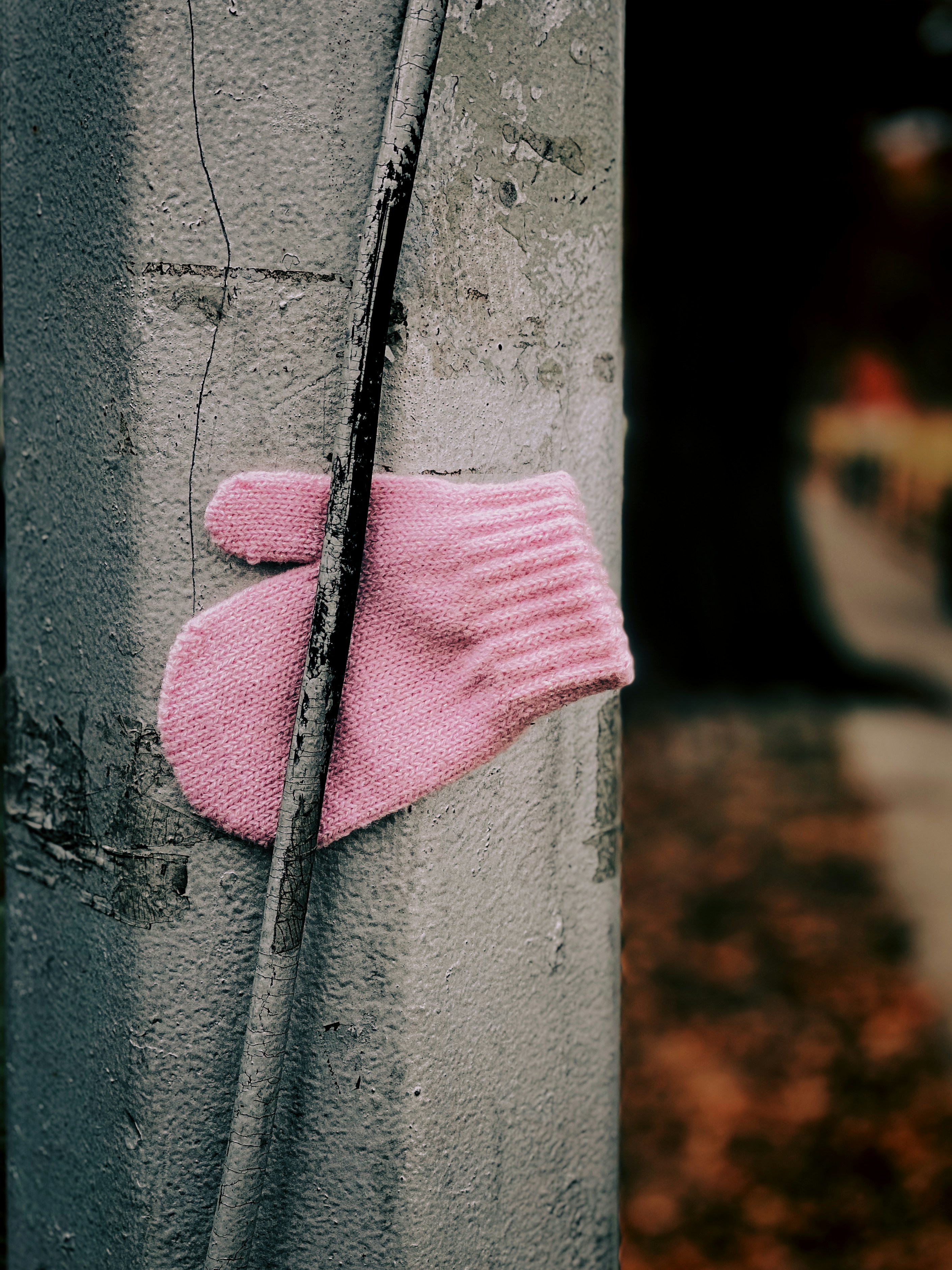 Pink mitten on wall photo – Free Purple Image on Unsplash