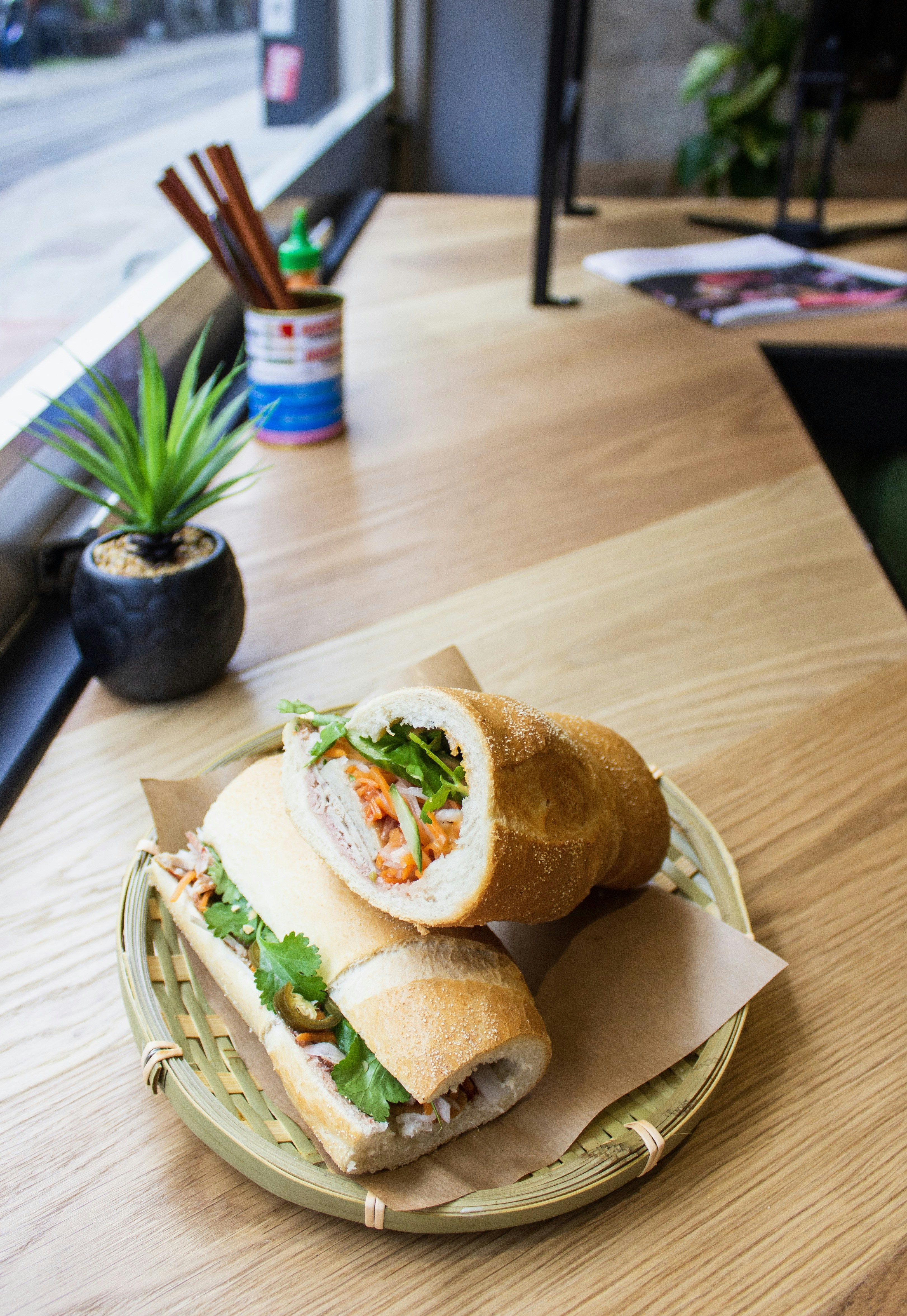 Heritage Bites: A Fresh Subway of Sandwiches on a Sunny Café Counter