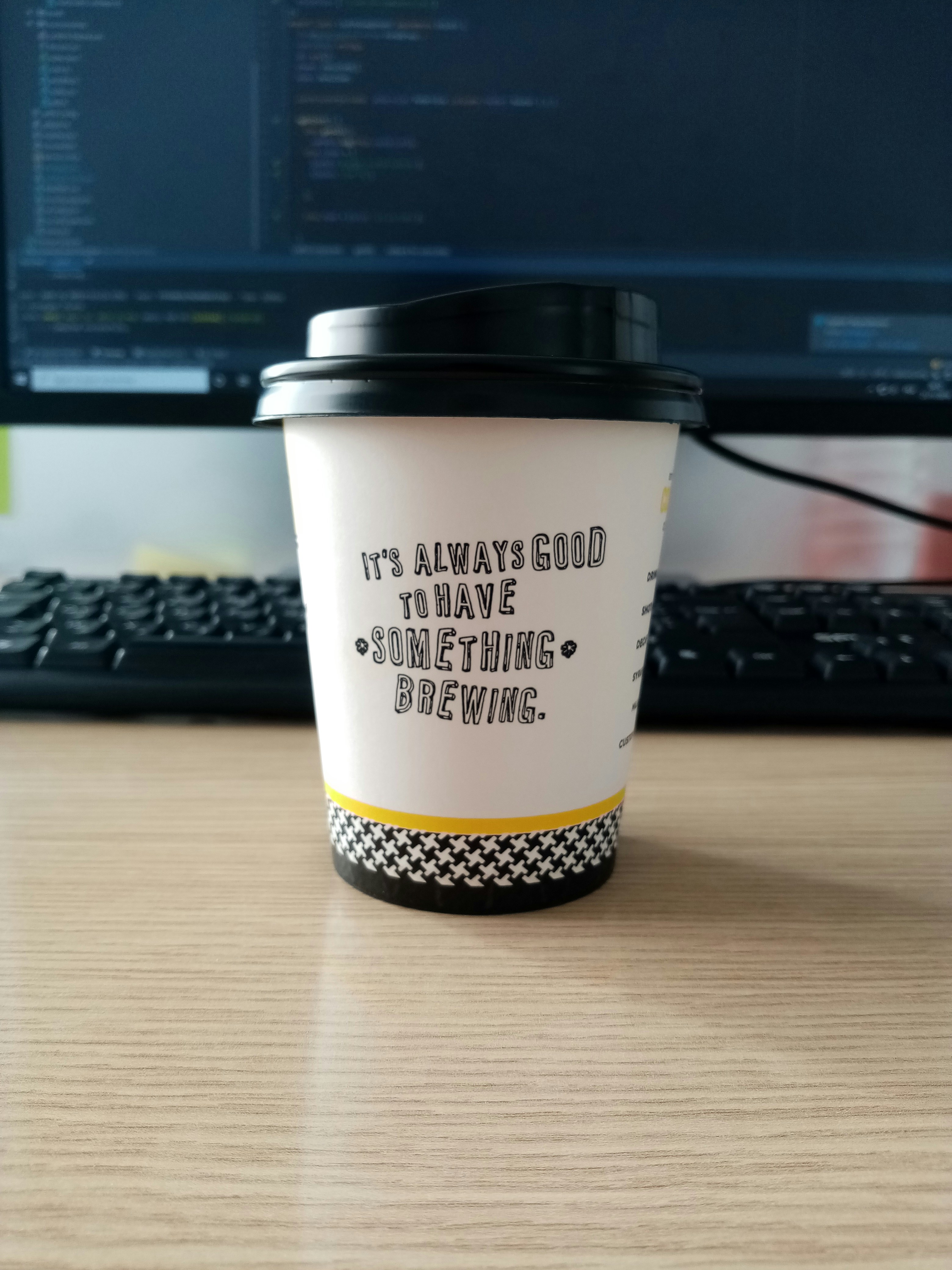 In-Between Code and Coffee: A Minimalist Desk Portrait.