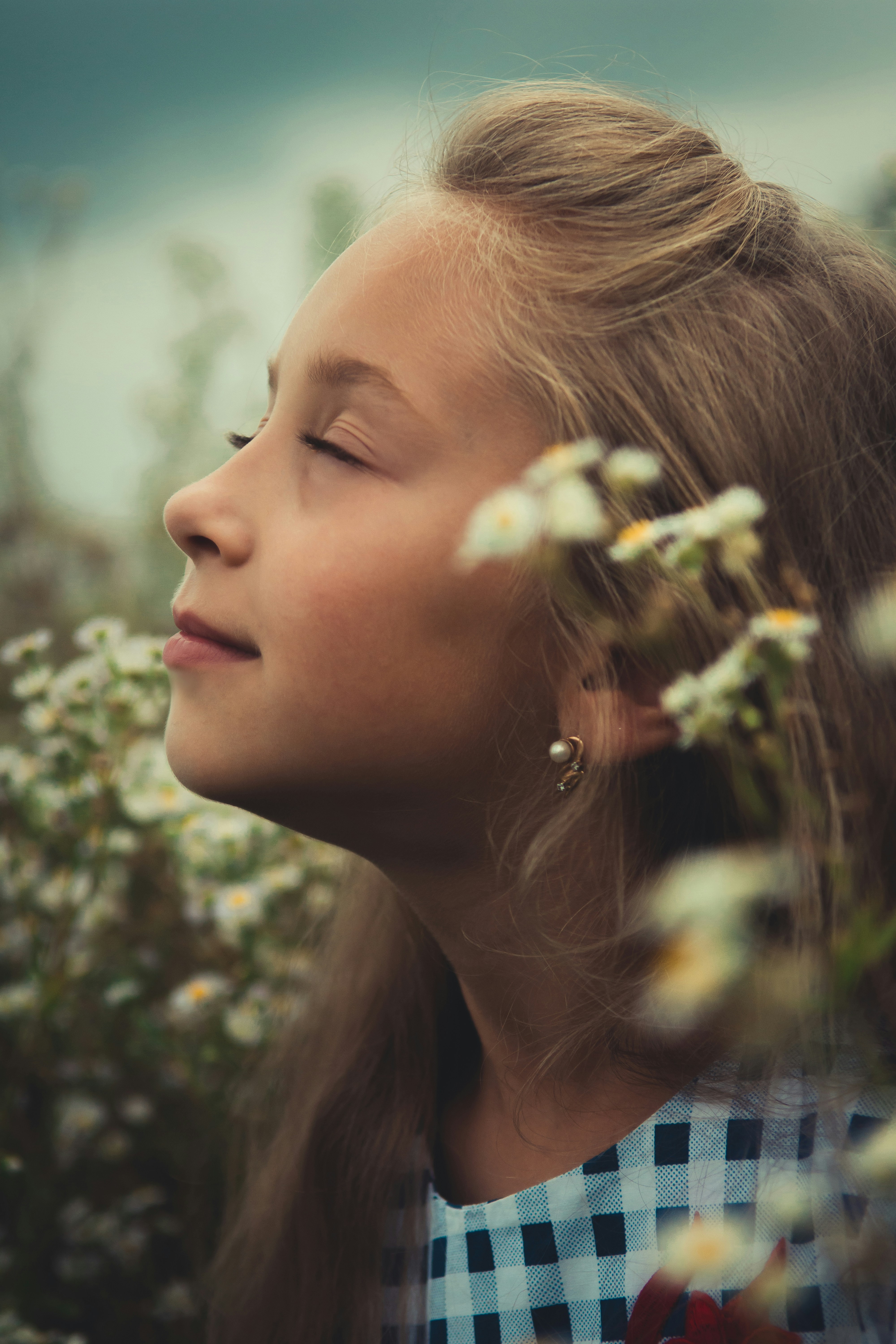 Sunlit Reverie: A Quiet Portrait Among Wildflowers