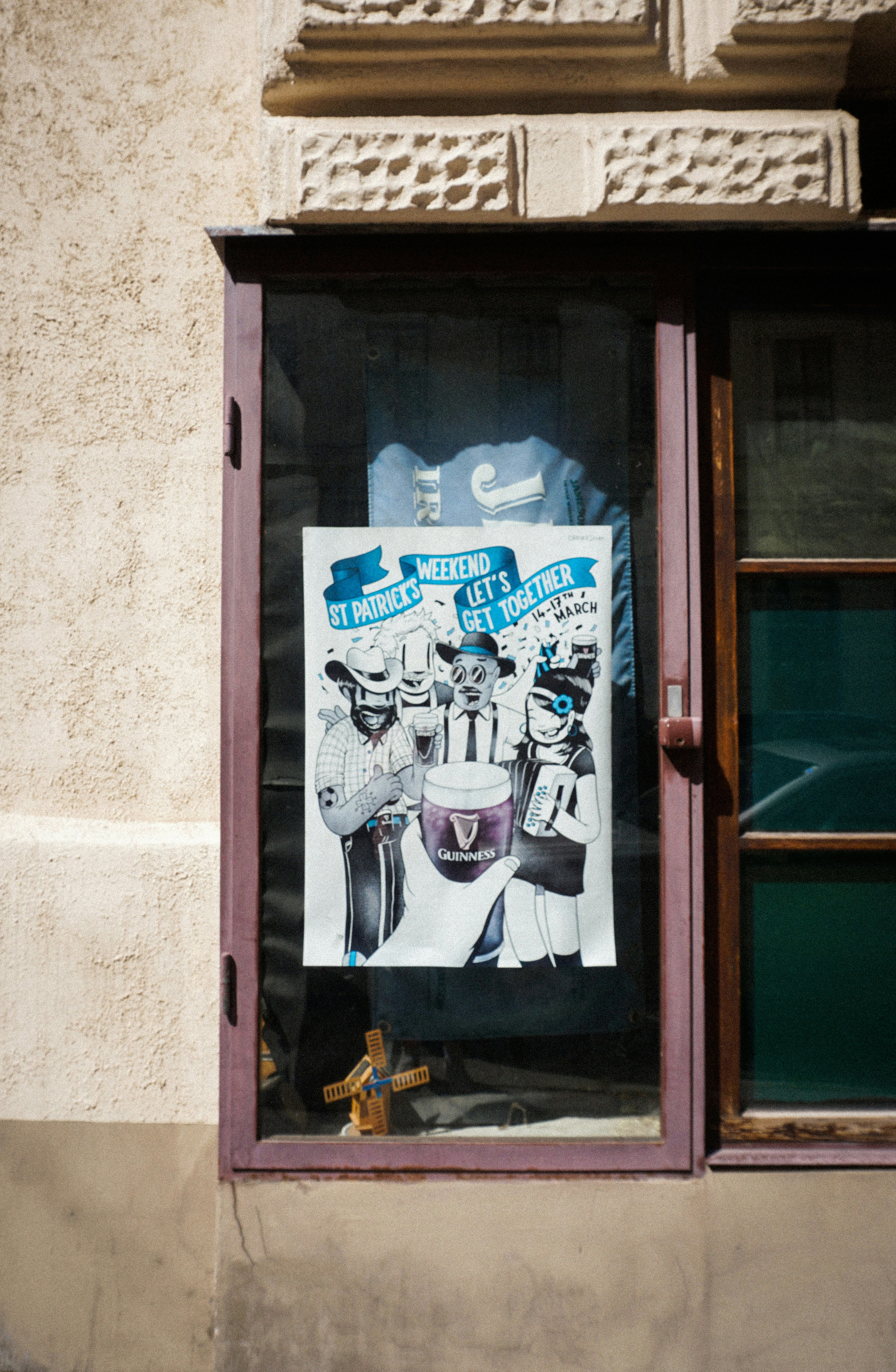 Poster on window photo – Free Austria Image on Unsplash