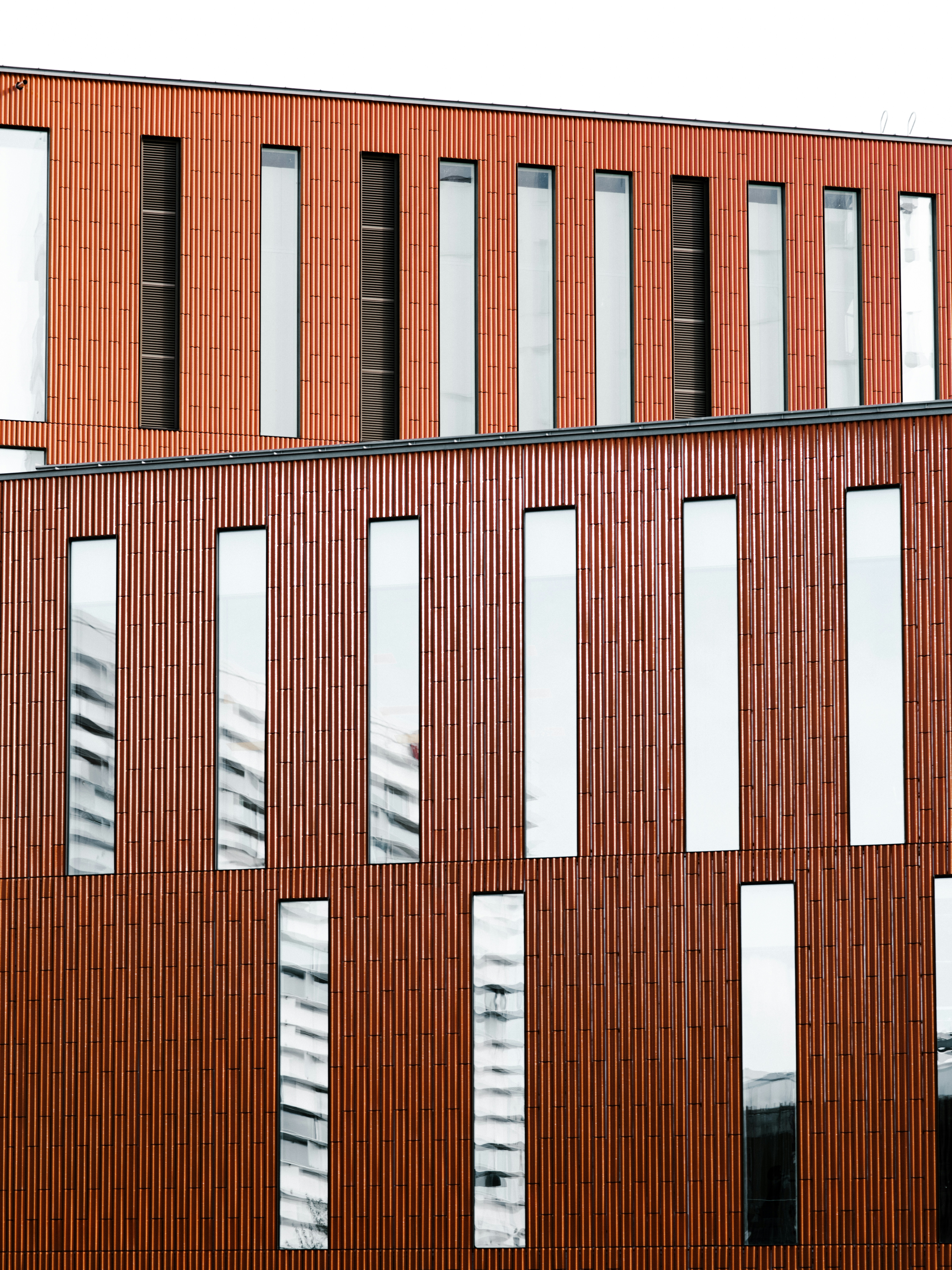 Maroon building photo – Free Malmö Image on Unsplash