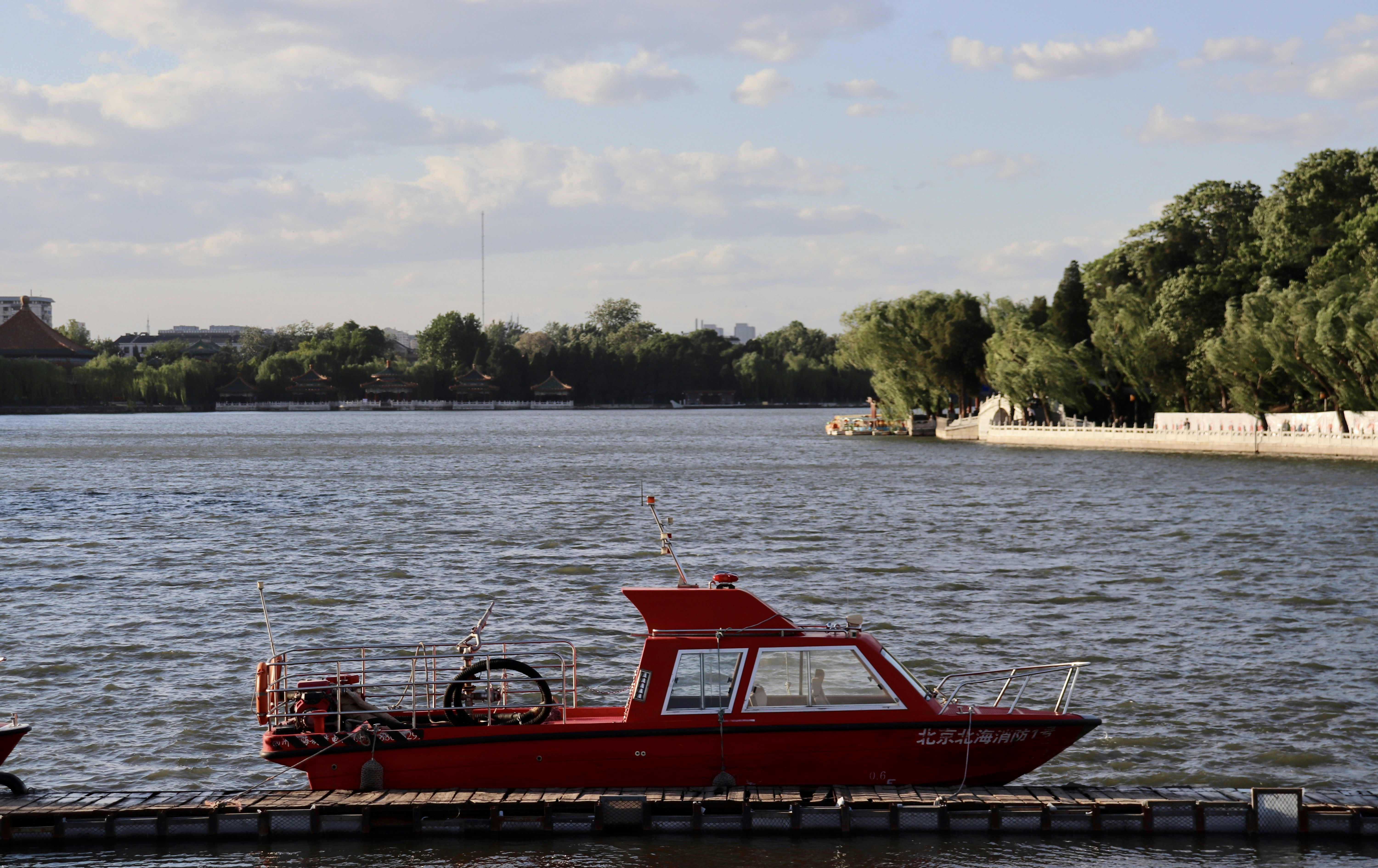 Red speedboat on the body of water photo – Free Grey Image on Unsplash