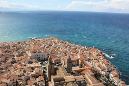 Coastal Harmony: Aerial View of Historic Architecture by the Sea