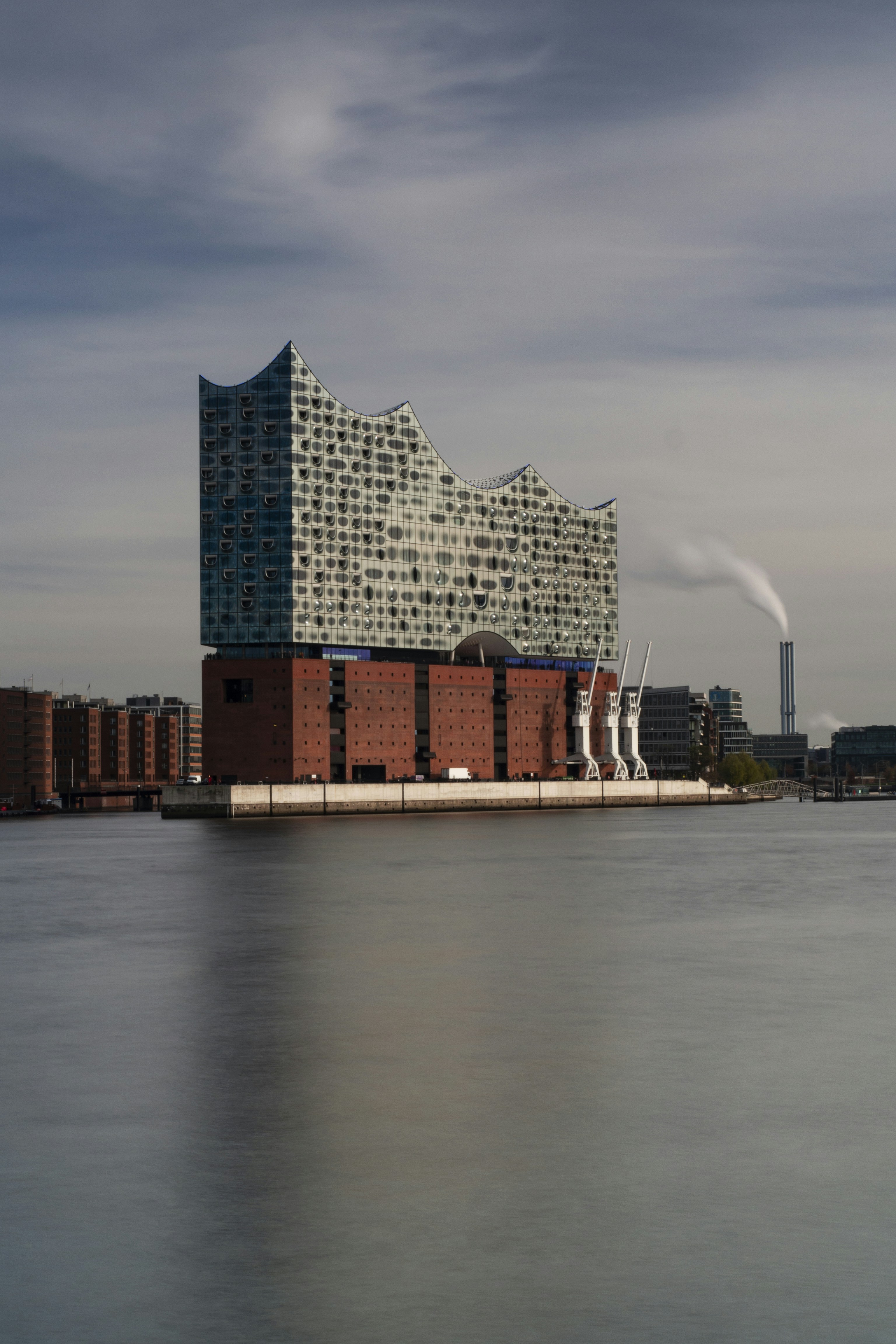 Waves of Glass: The Elbphilharmonie's Faceted Silhouette Over Hamburg Harbor