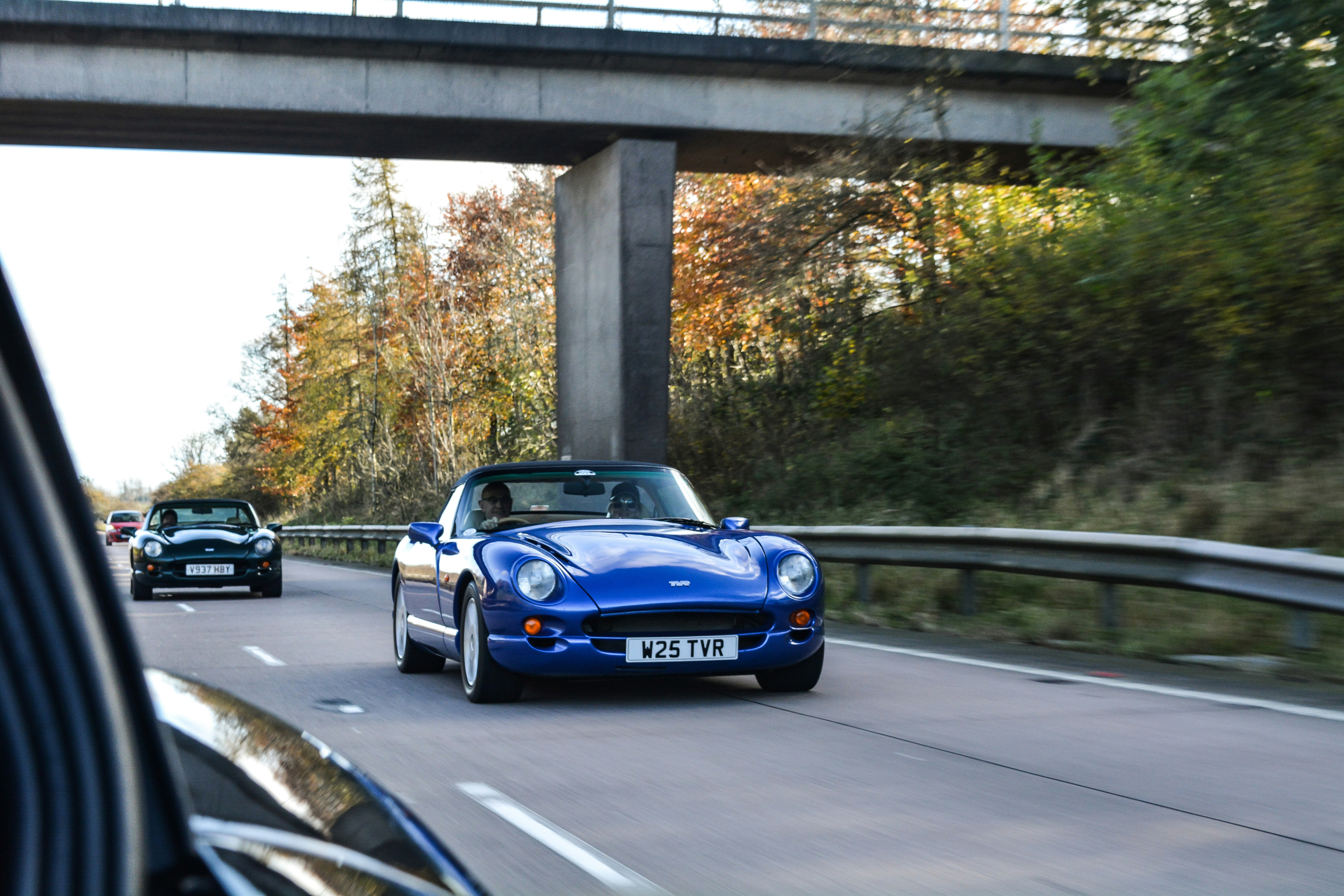 Velocity in Motion: A Blue Sports Car's Journey