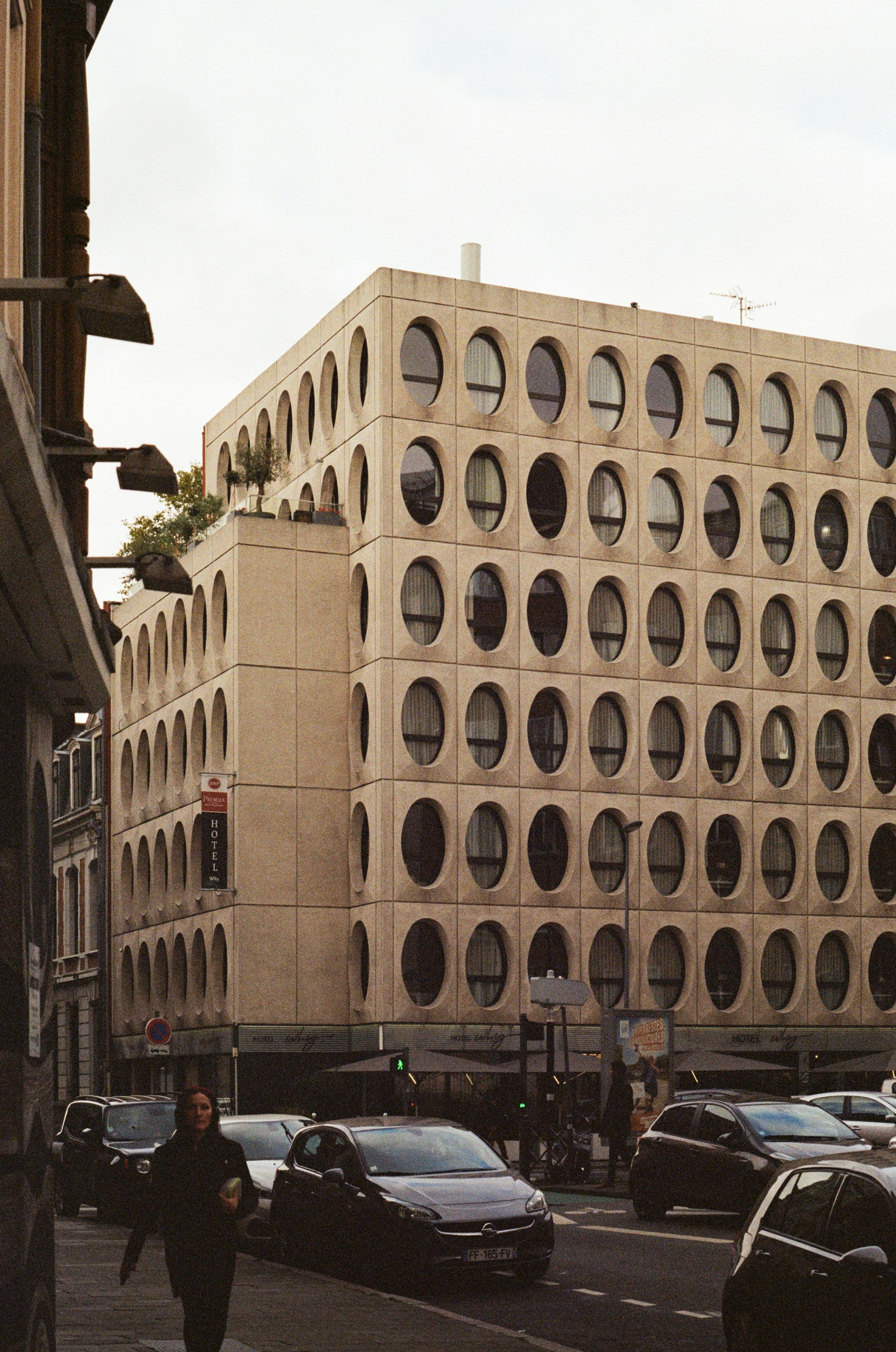 Circle-Walled Office Across a Busy Street