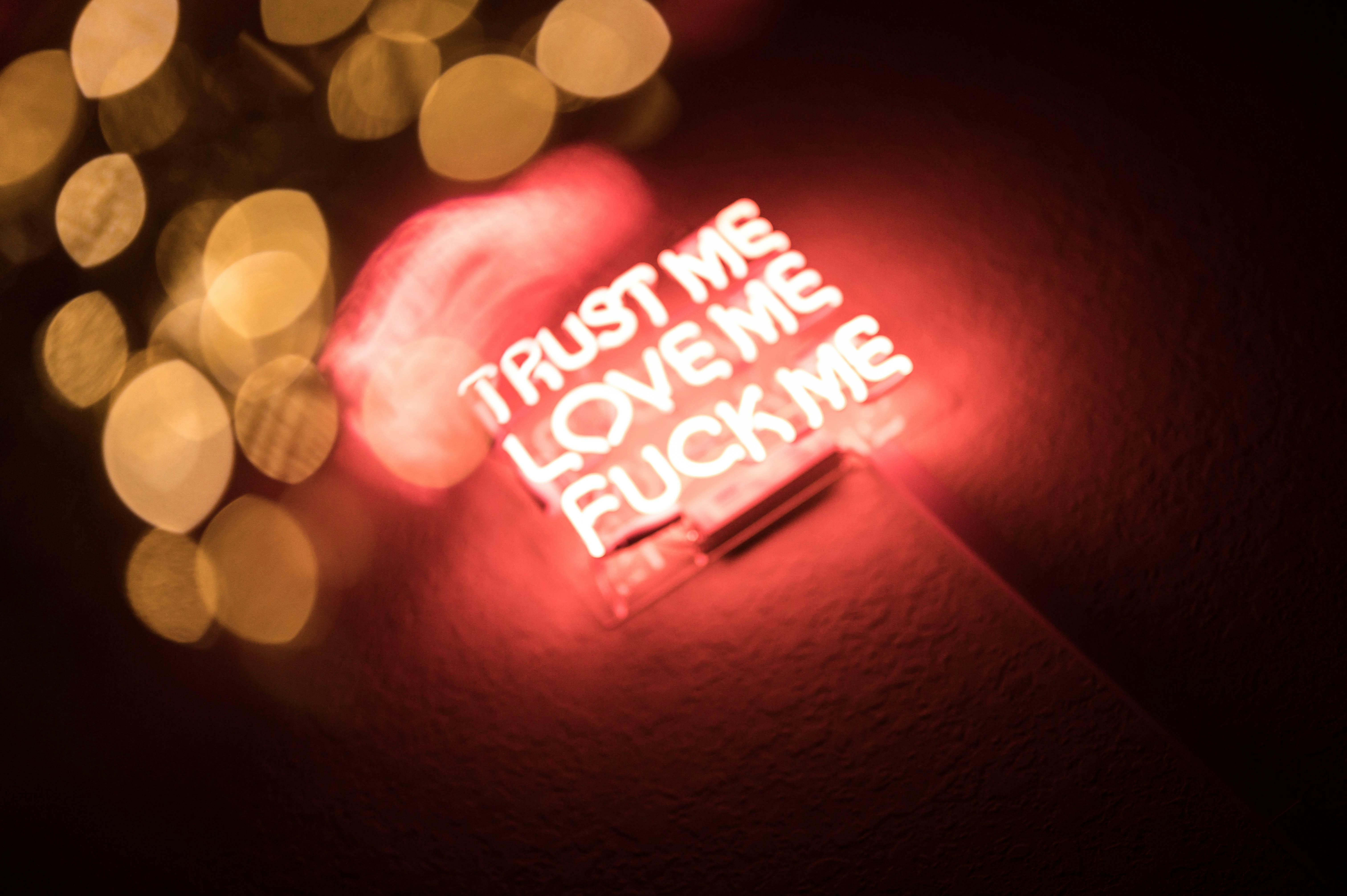Red Neon Confession in Velvet Blur