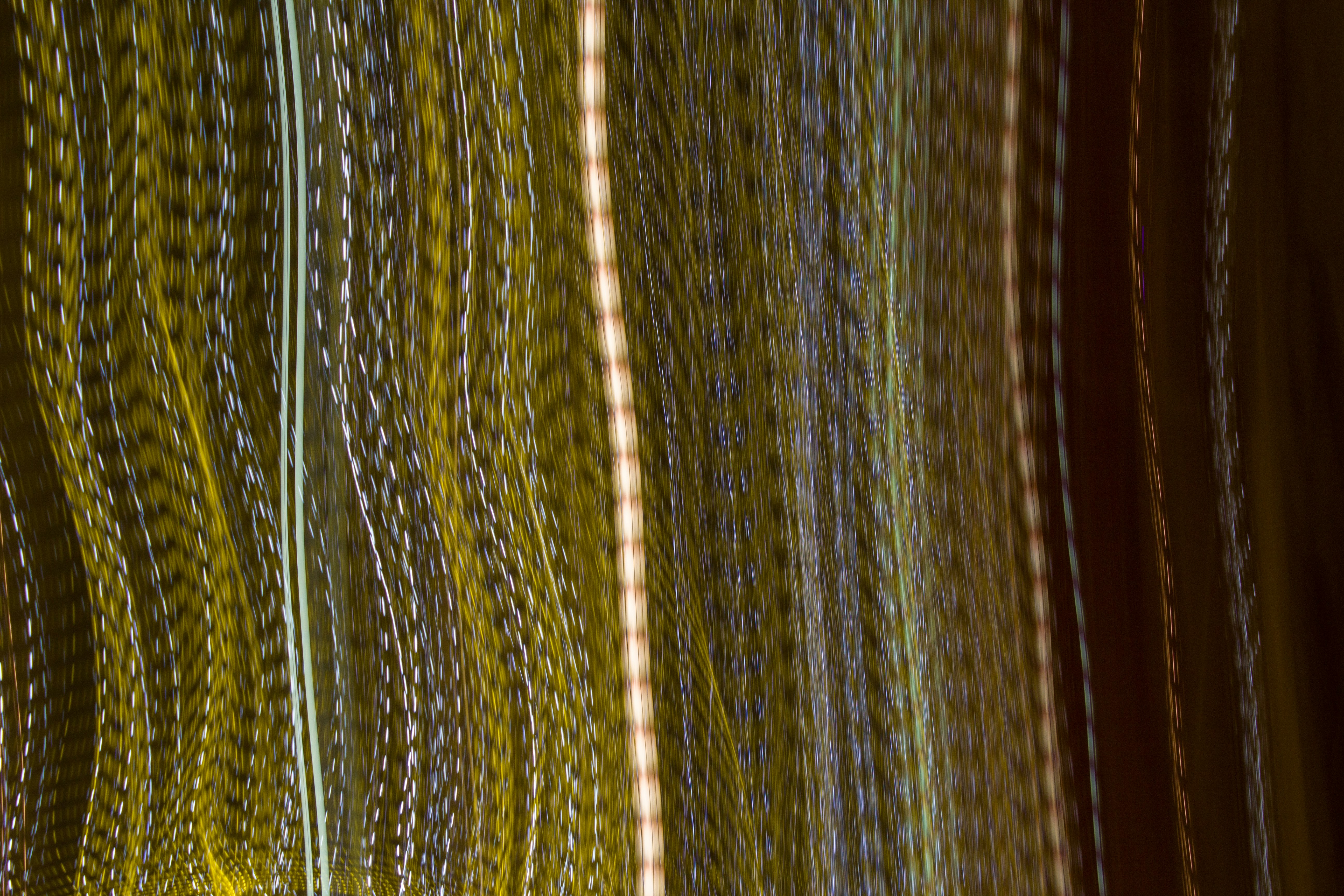 Abstract representation of light trails creating a mesmerizing pattern of colors and movement.