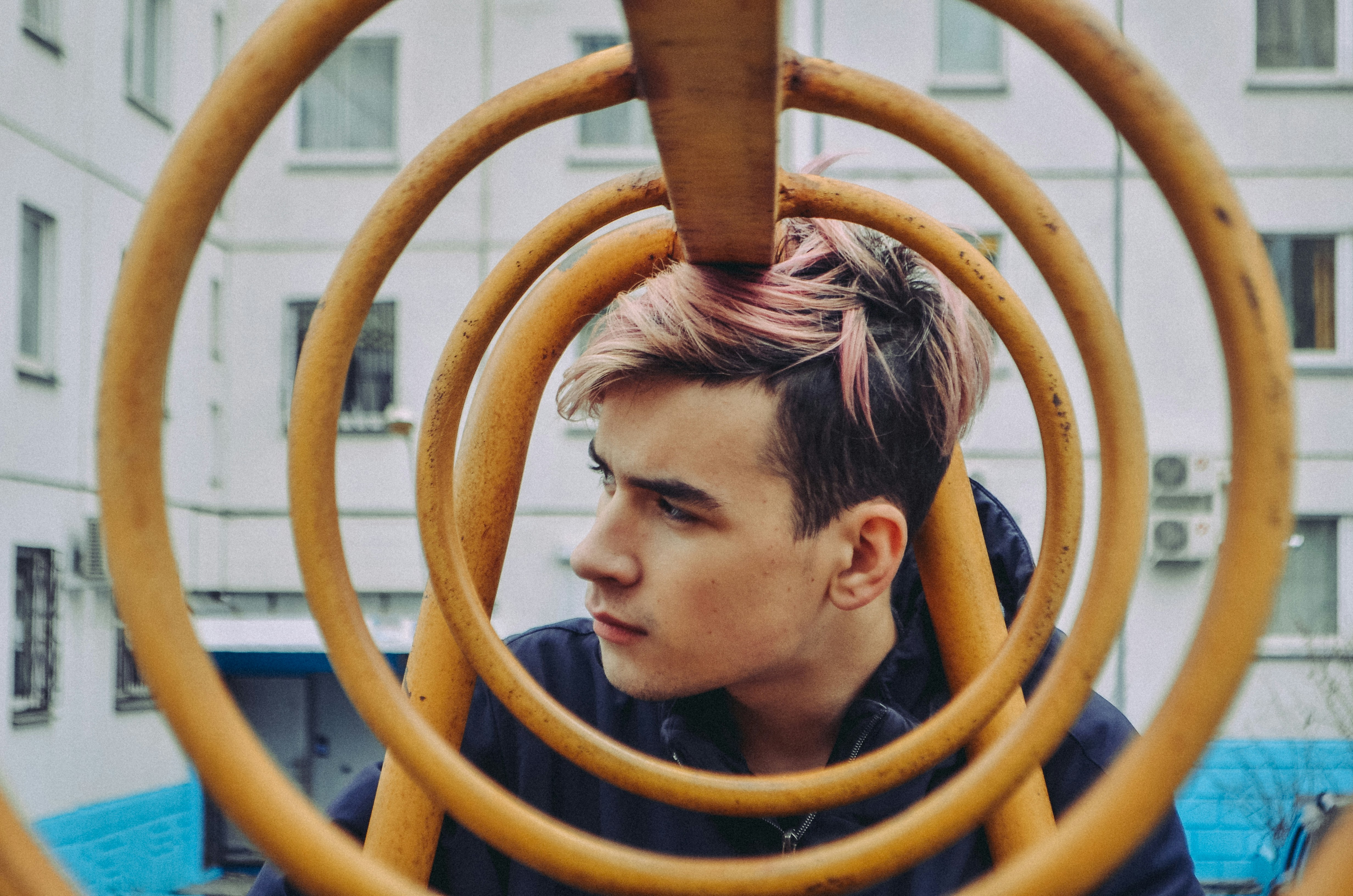 Through the Rings: A Quiet Portrait of Focus and Framing
