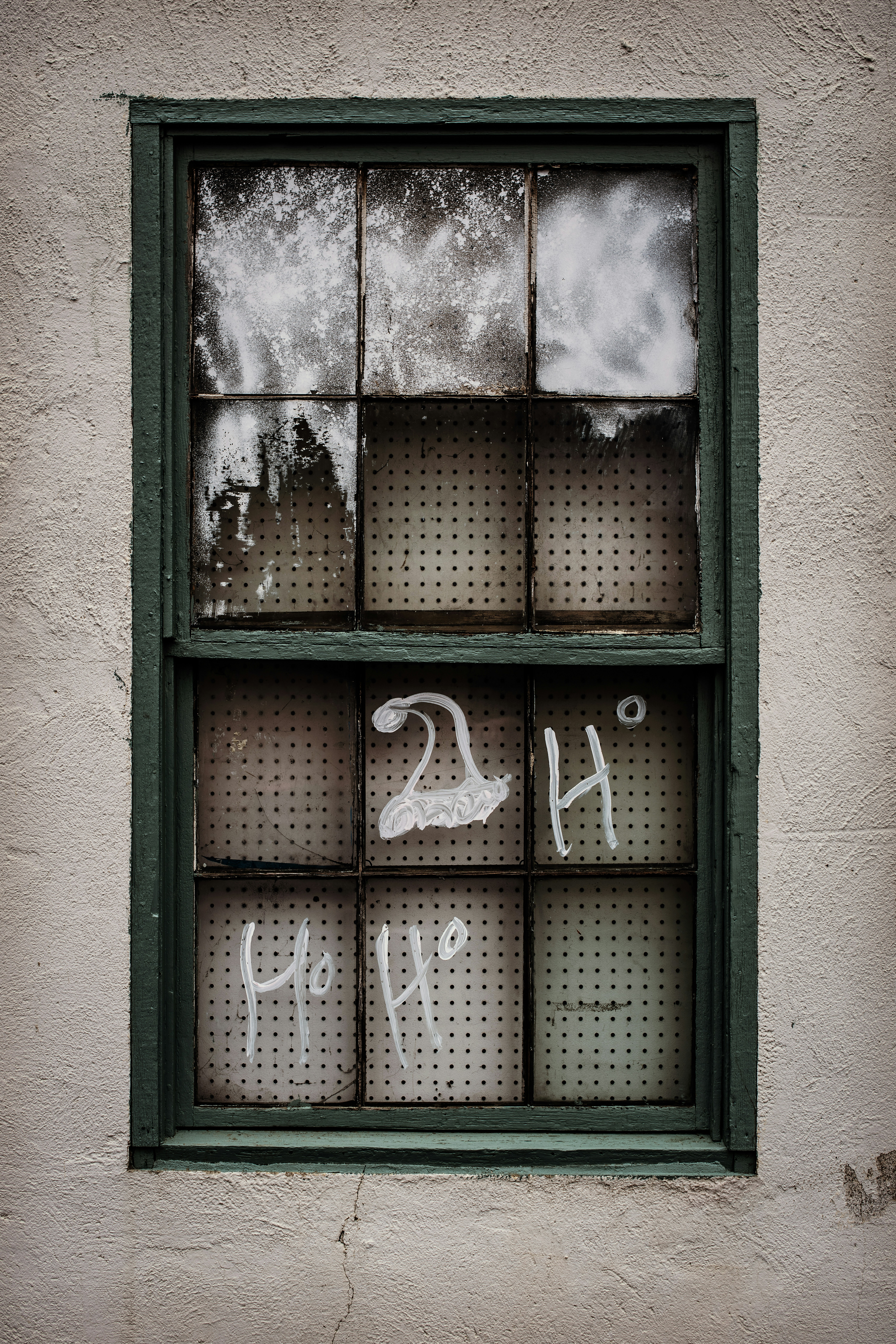 Chalked Grid on a Frosted Window: A Quiet Facade Portrait