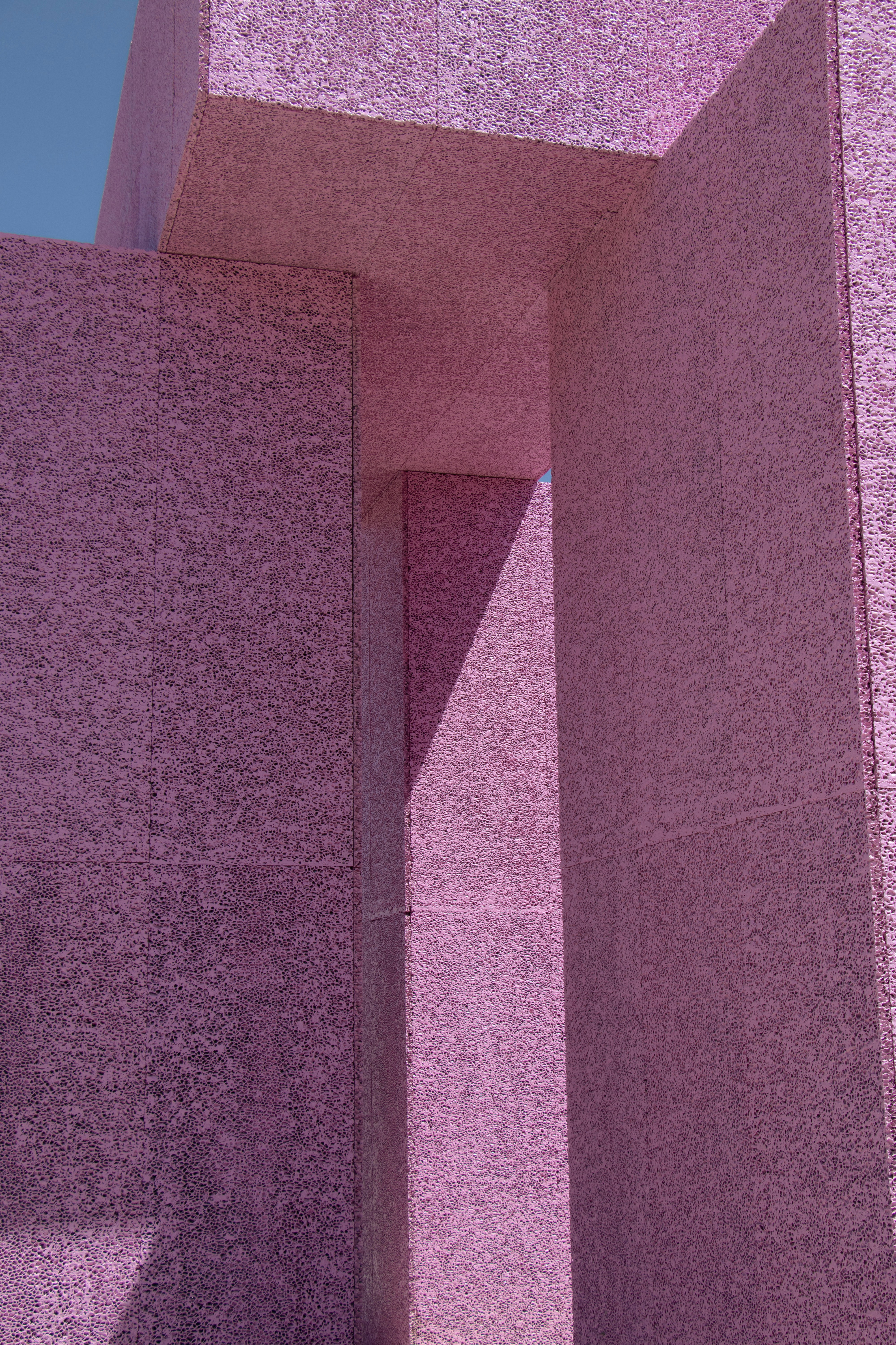 Magenta Monoliths: A Labyrinth of Light and Shadow