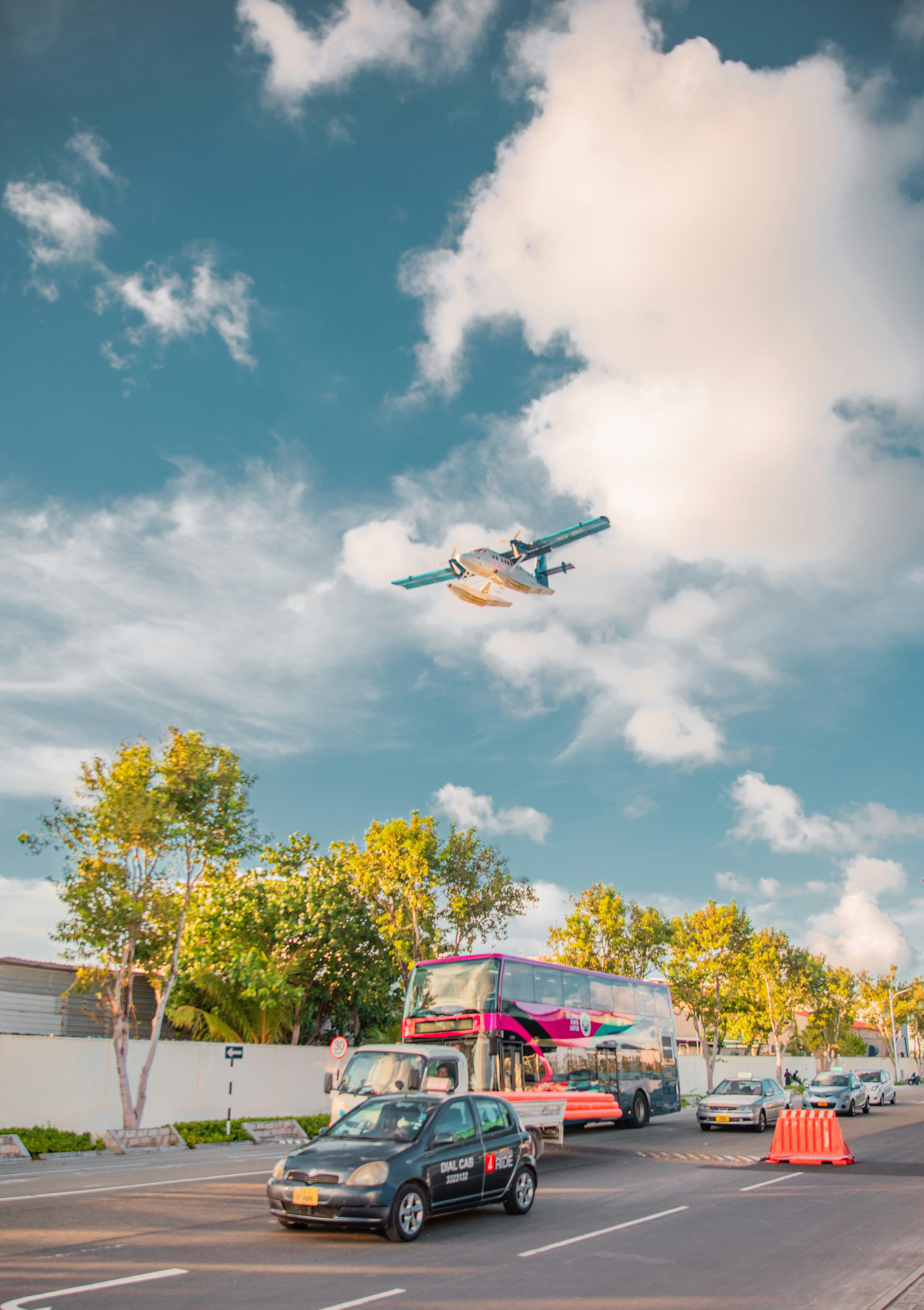 Airborne Rescue: Twin-Turboprop Skirting a Sky-Path Over a Busy Road