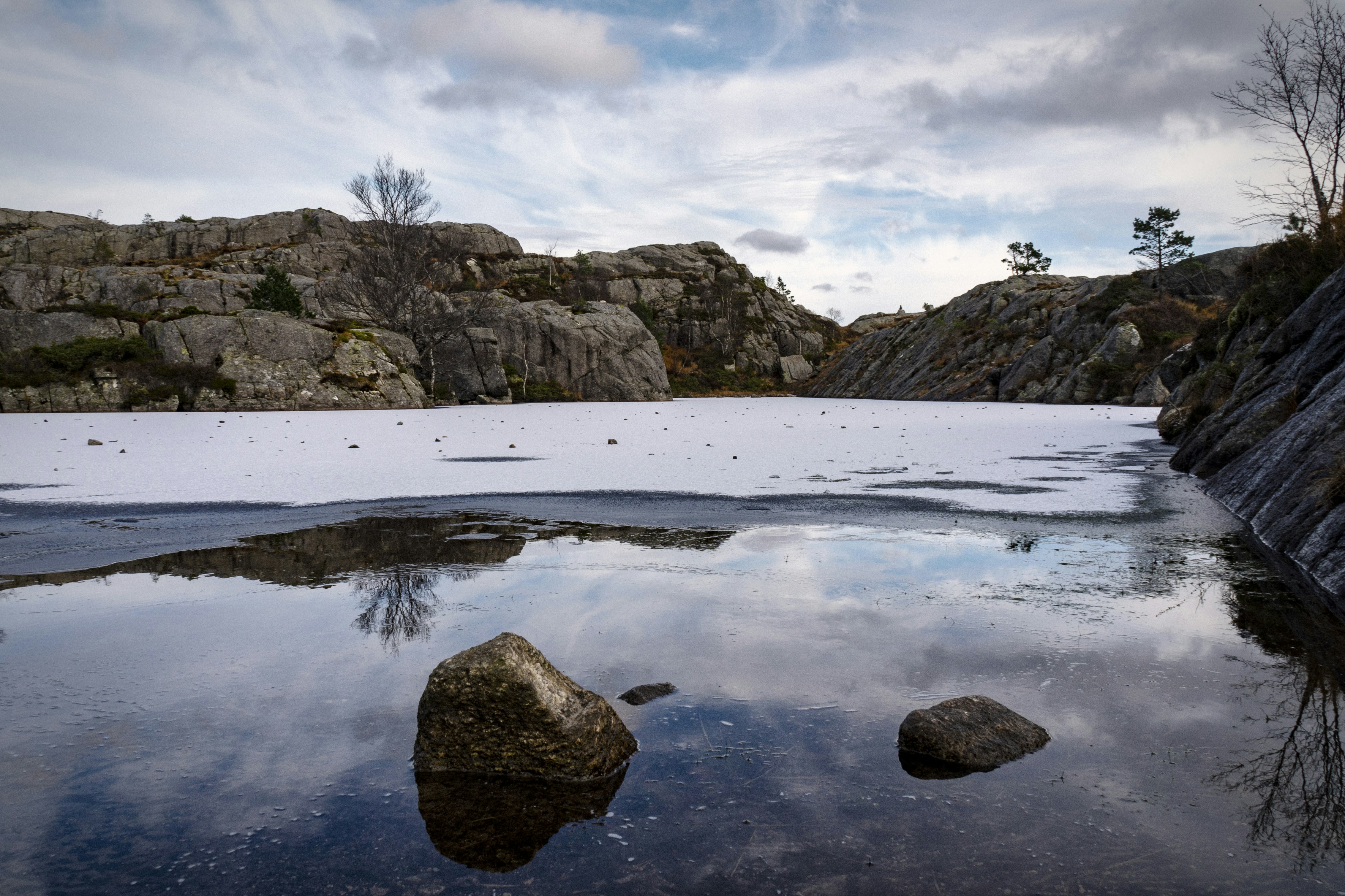 Still Waters, Weathered Rocks: A Quiet Quarry at Dusk