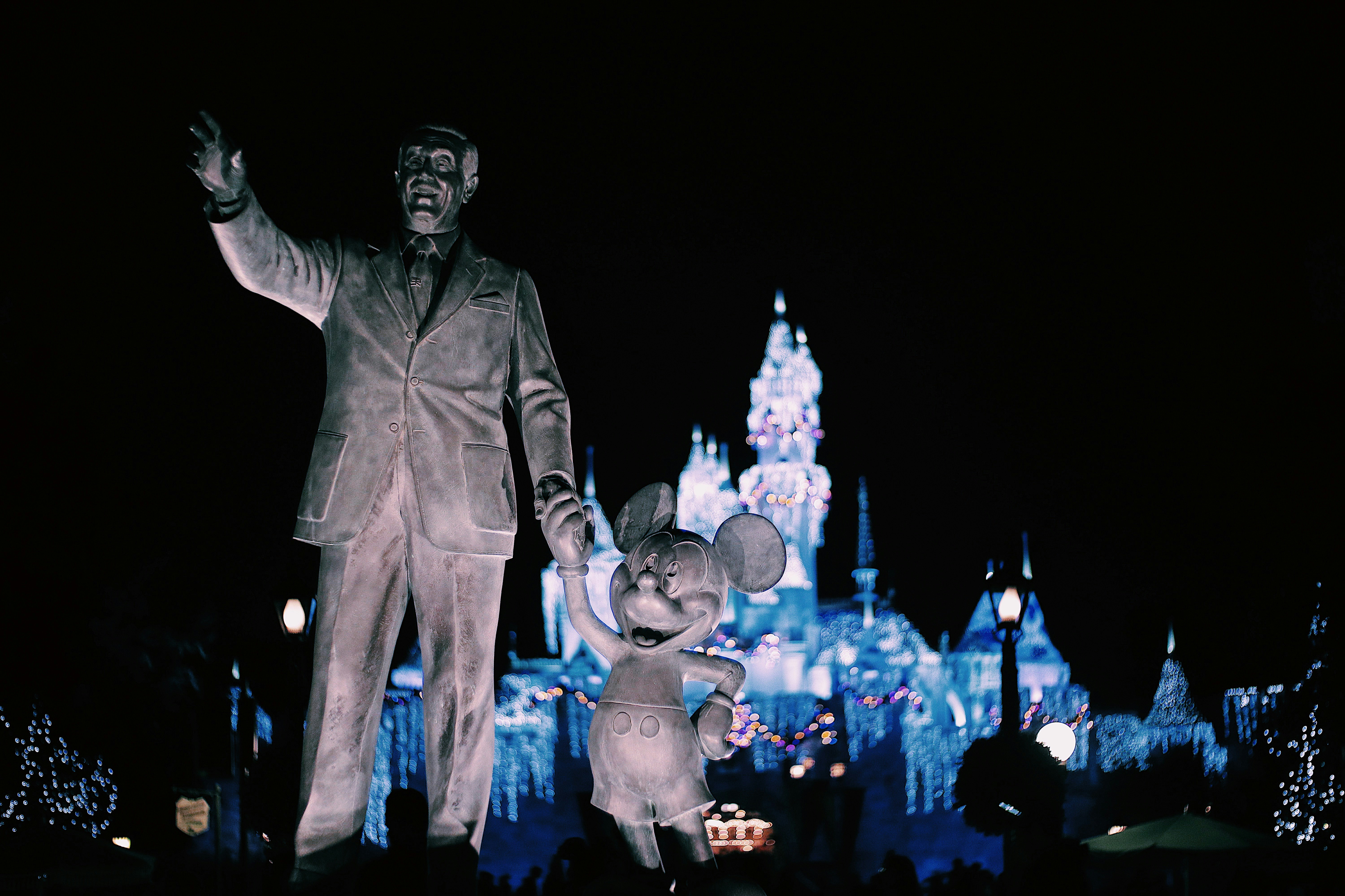 Walt Disney And Mickey Mouse Holding Hands