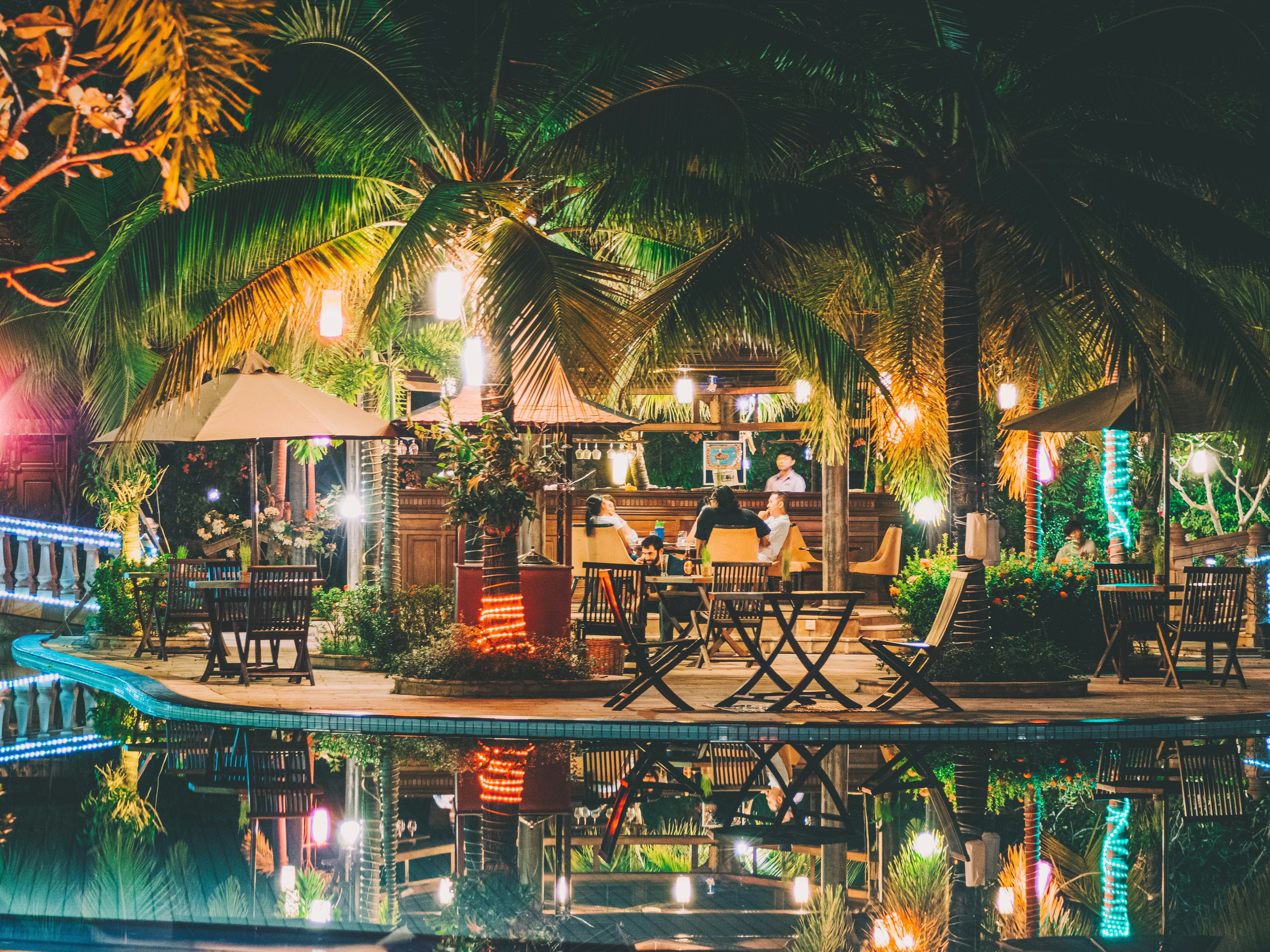 Photography of a hotel's swimming pool at night photo – Free Building ...