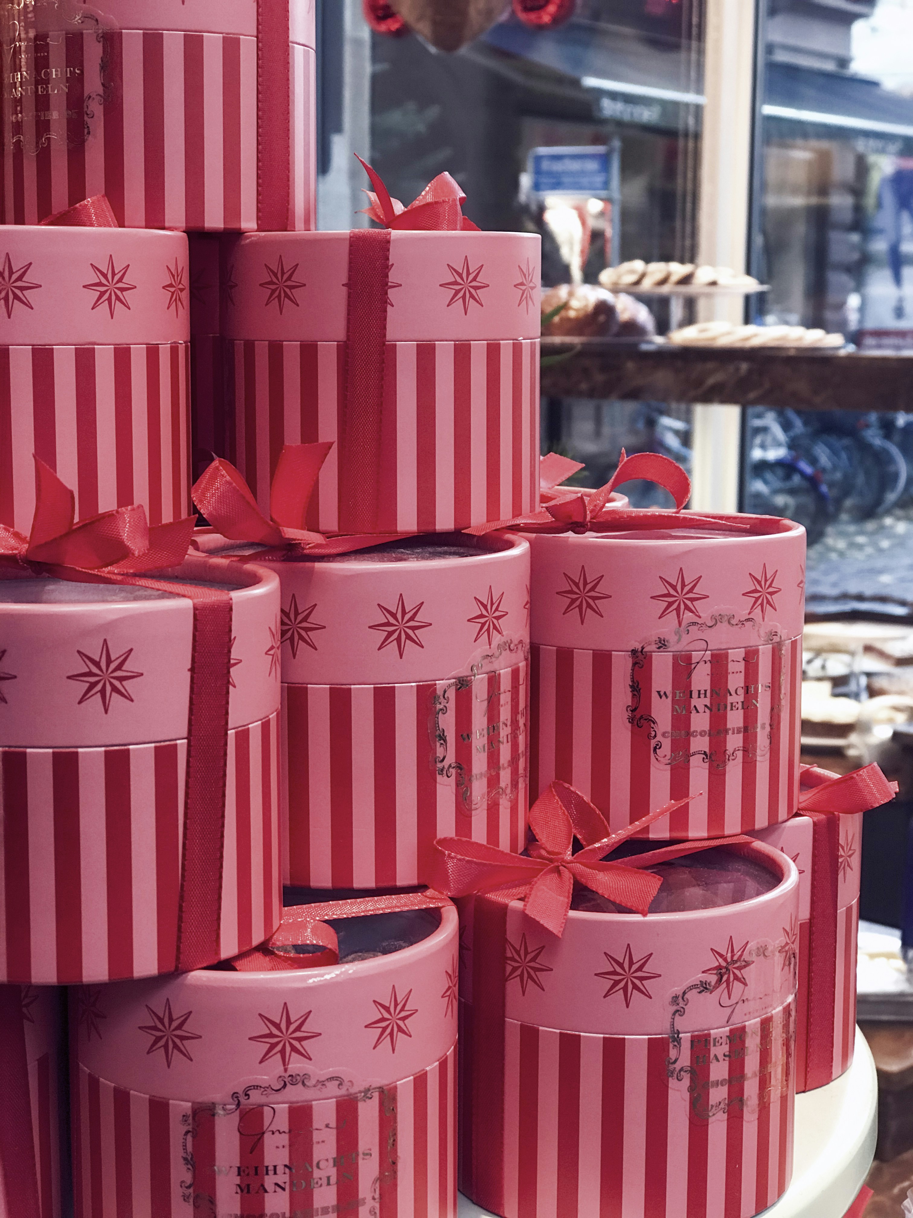Rosy Gift Tin Tower: Pink Stripes, Red Ribbons in a Shop Window