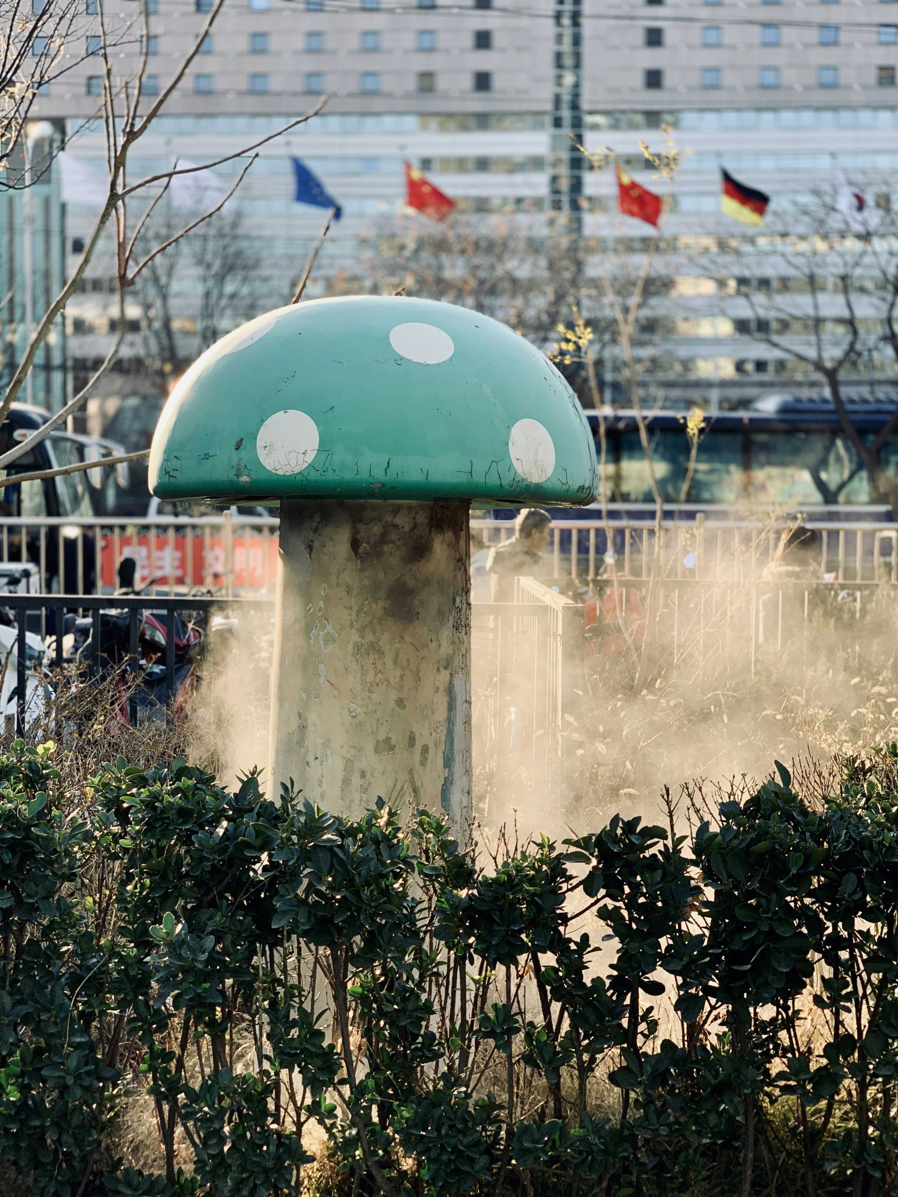 green and white mushroom statue during daytime