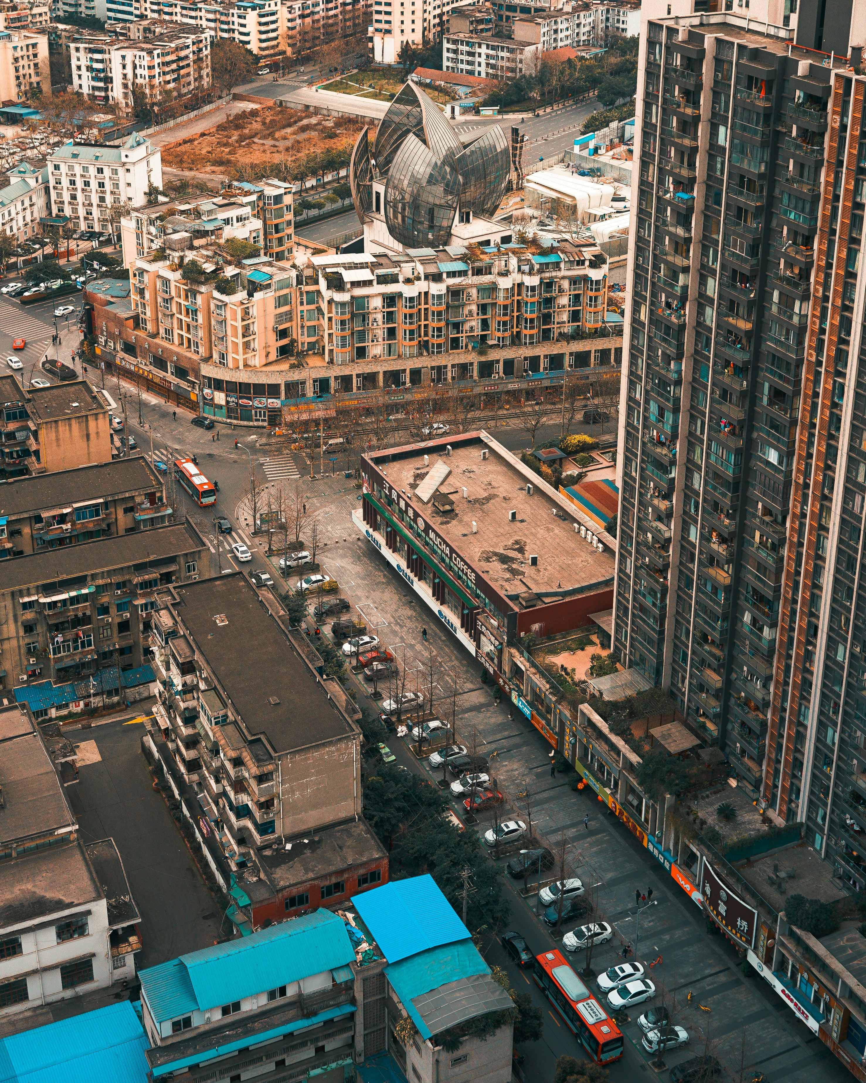 Chrome Sail Rising Above the Urban Grid