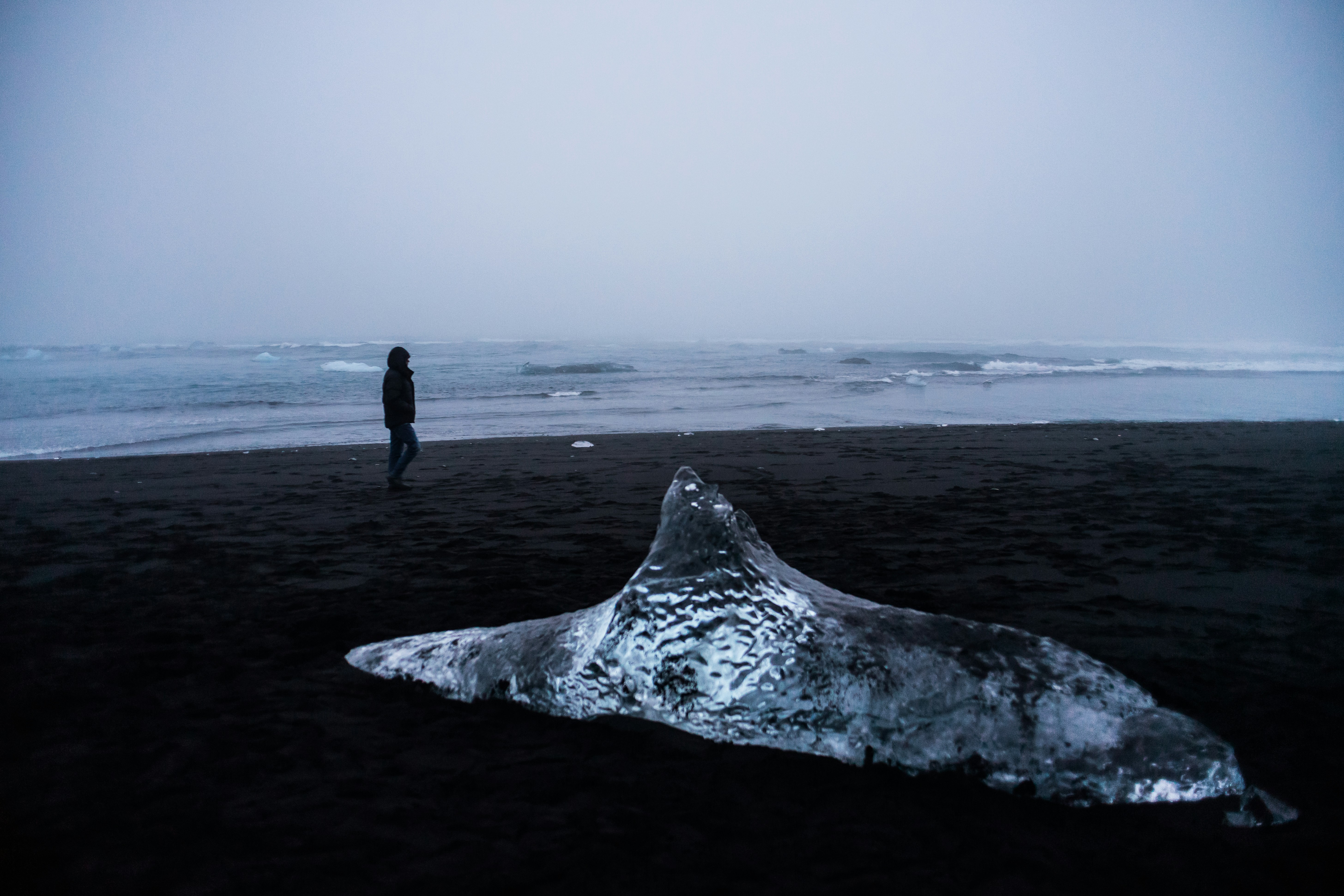 Blue Silence on Black Sand: Lone Walker and the Ice Monolith