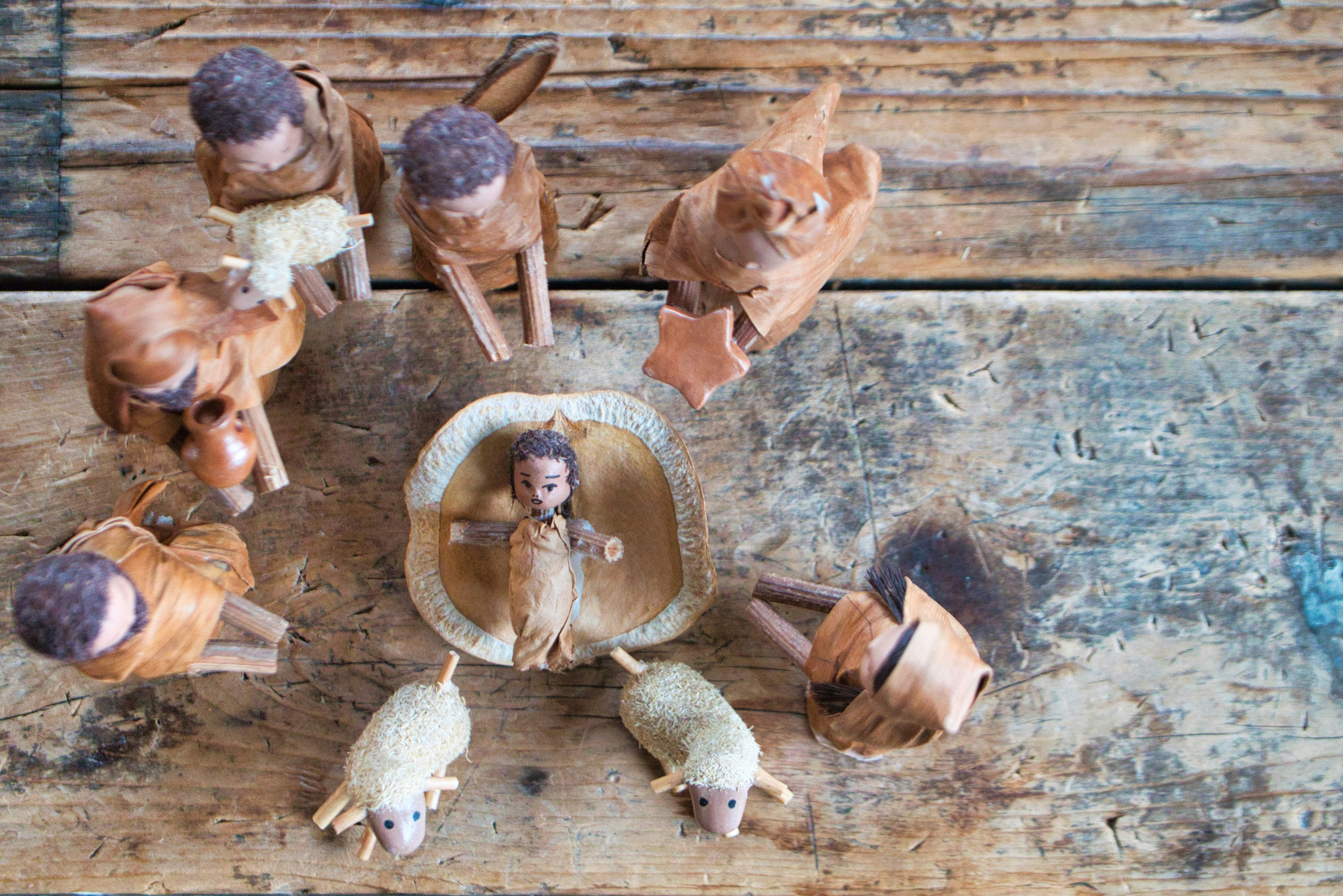 Overhead Nativity Tableau: Baby in the Manger Surrounded by Rustic Figures