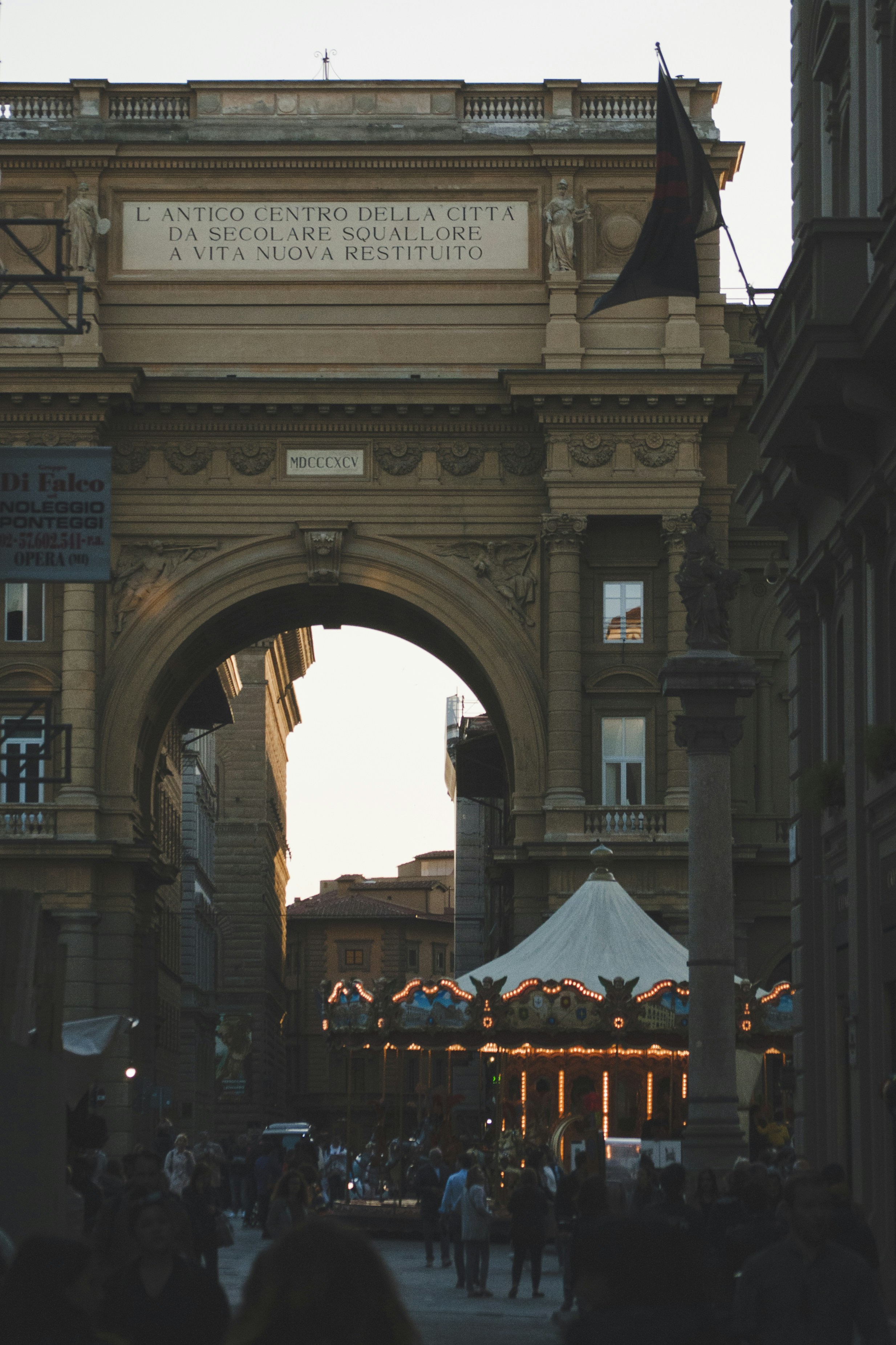 Archway of the City: Evening Light Over the Piazza