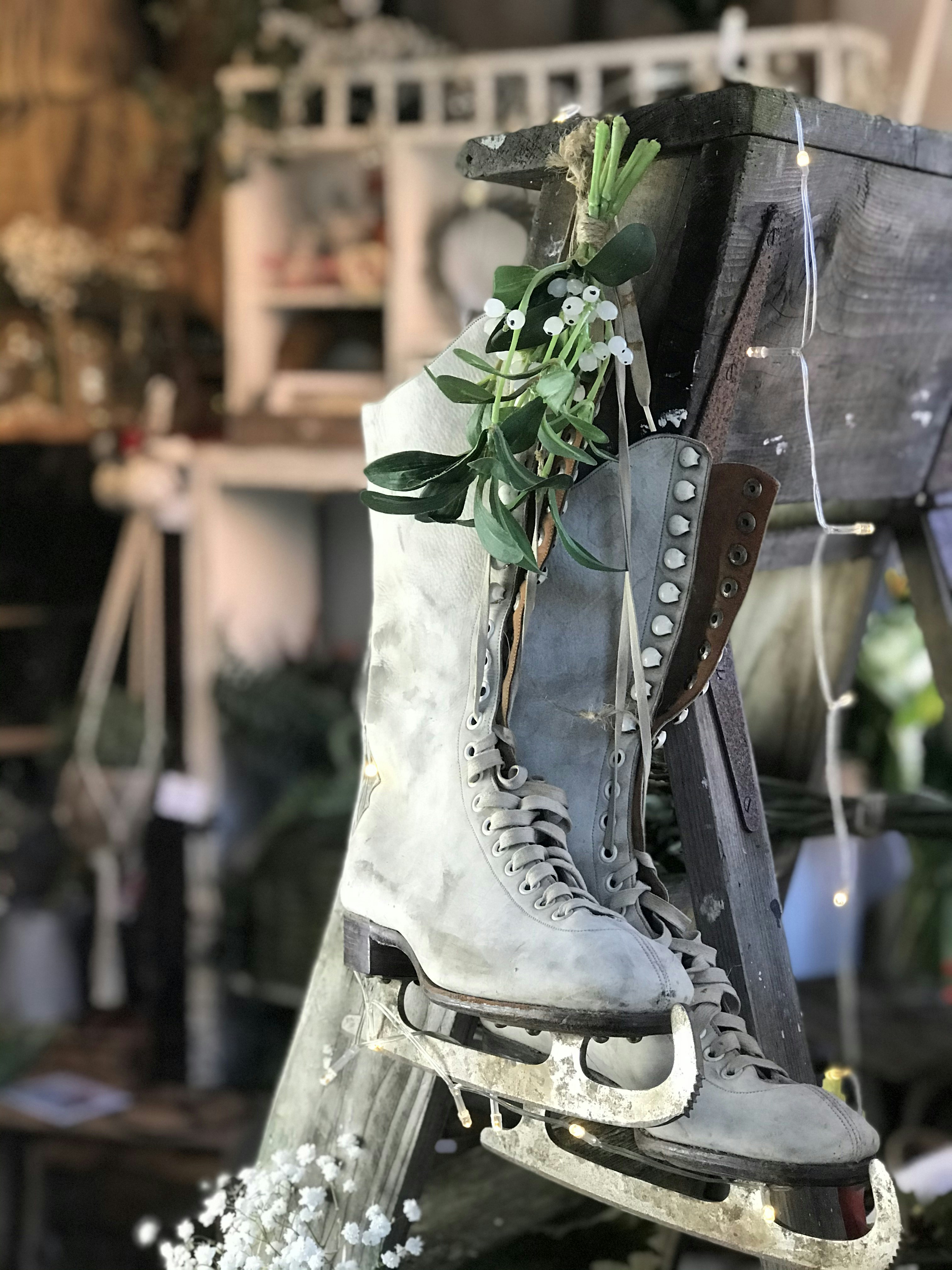 pair of gray ice skating shoes