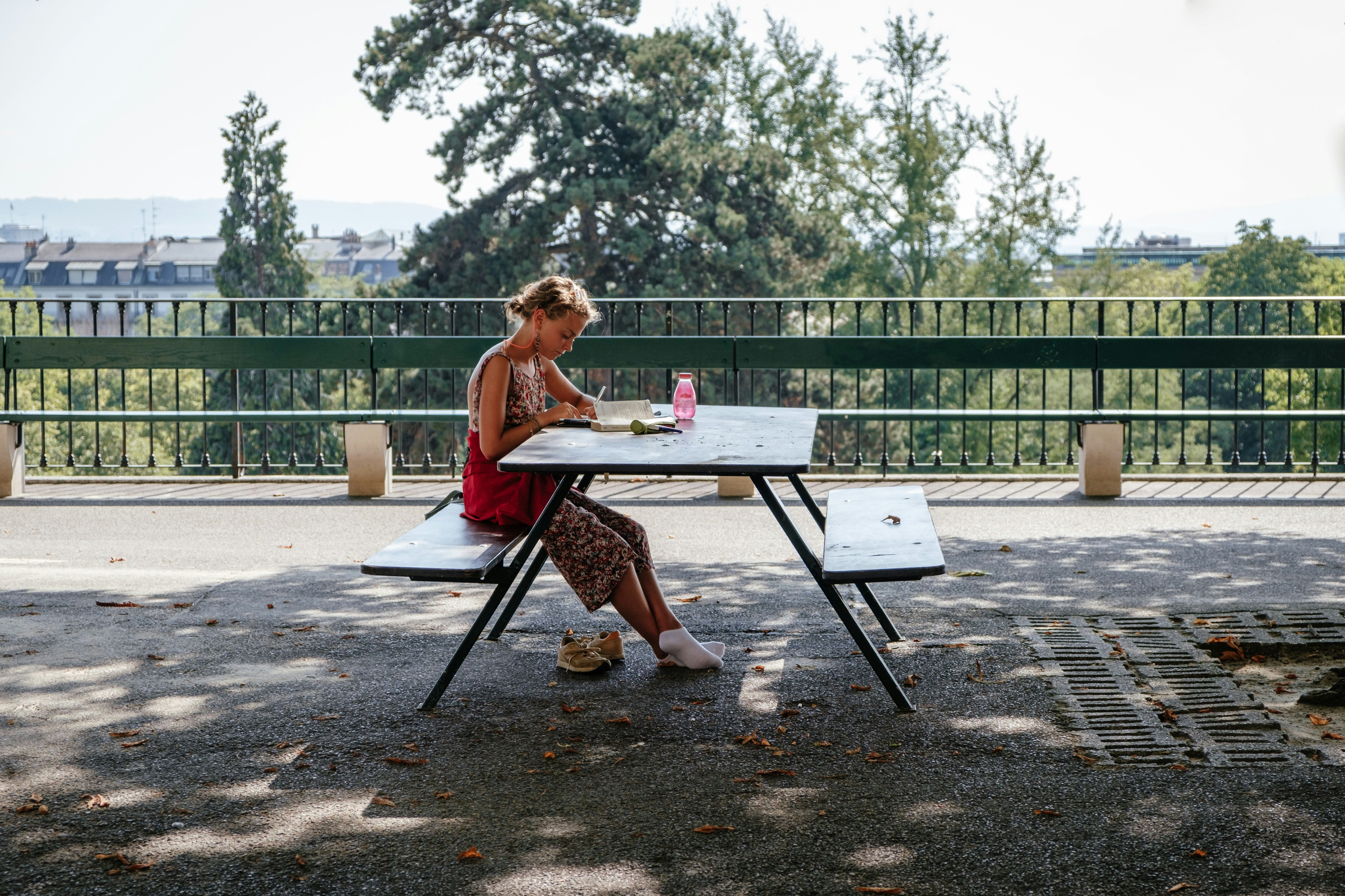 Dappled Light at Riverside: A Quiet Moment at the Picnic Table