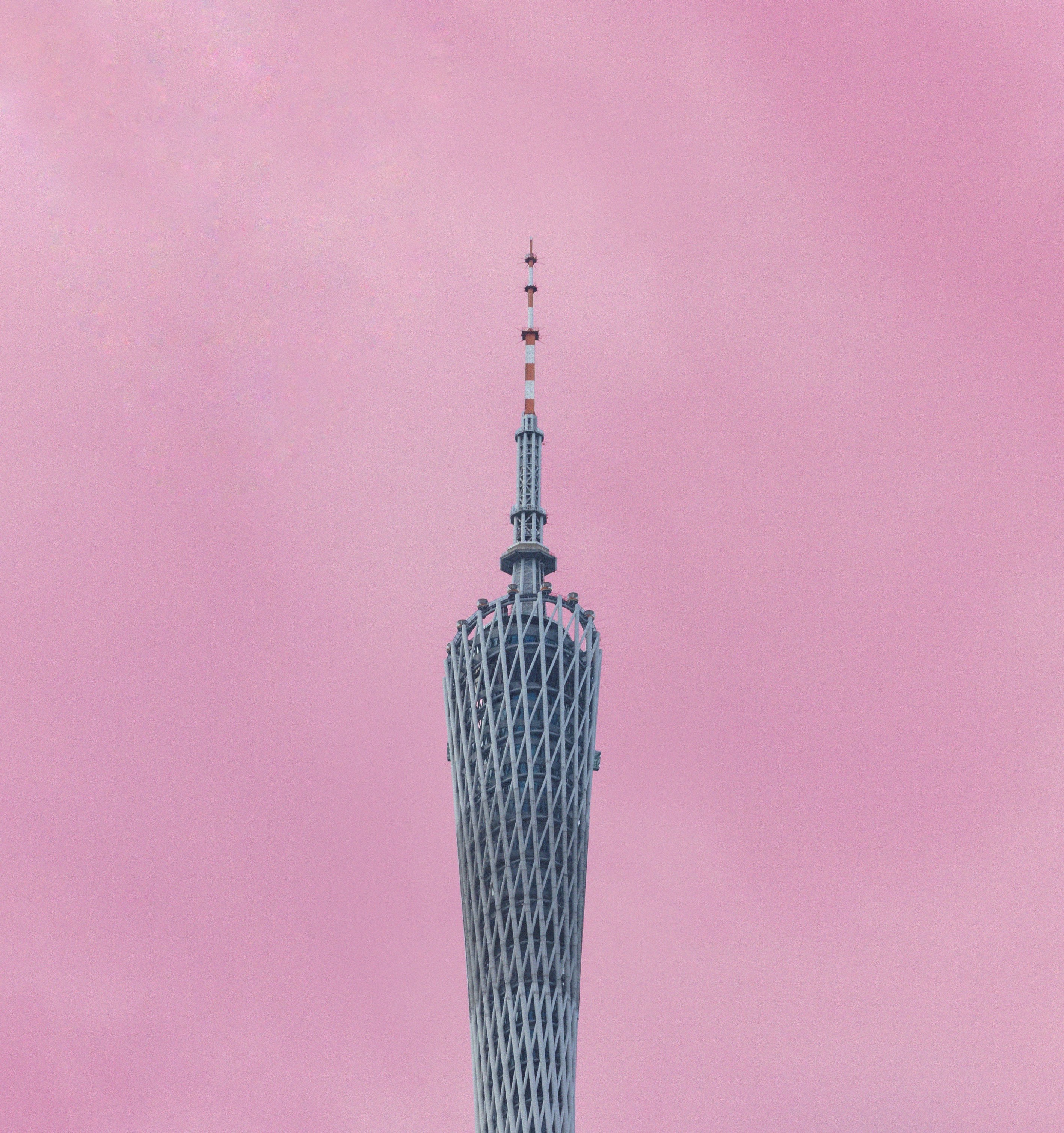 Pastel Spire: The Canton Tower against a Blush Sky