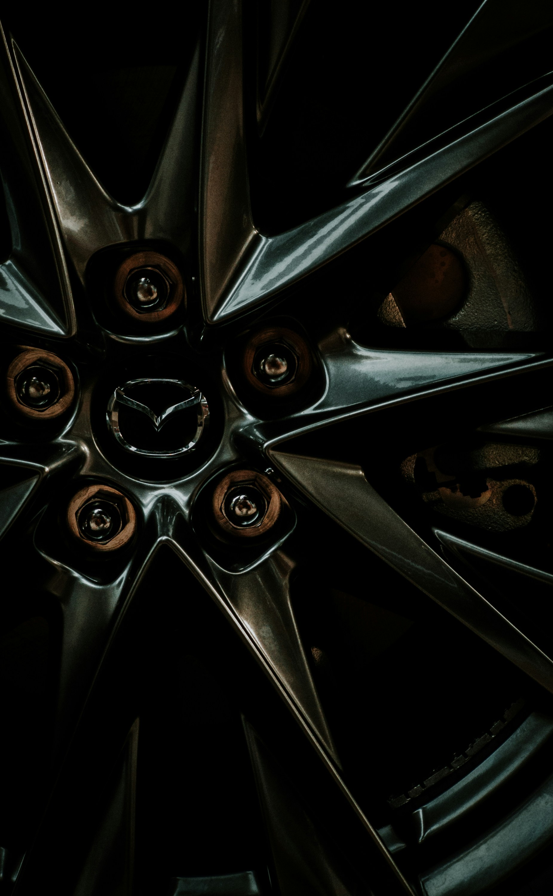 Chromed Constellation: Close-Up of a Mazda Wheel Crest