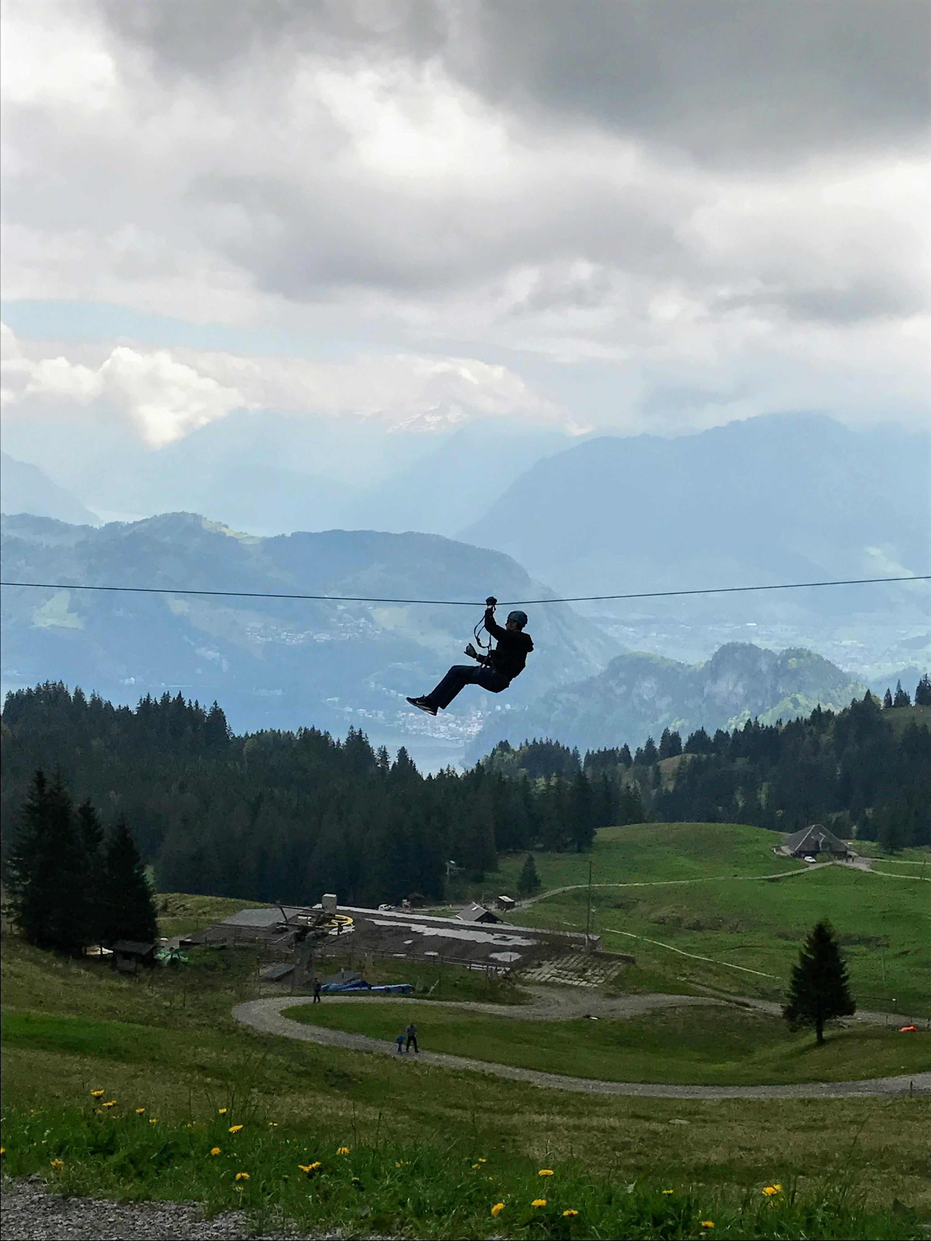 Airborne Silhouette Over an Alpine Ridge