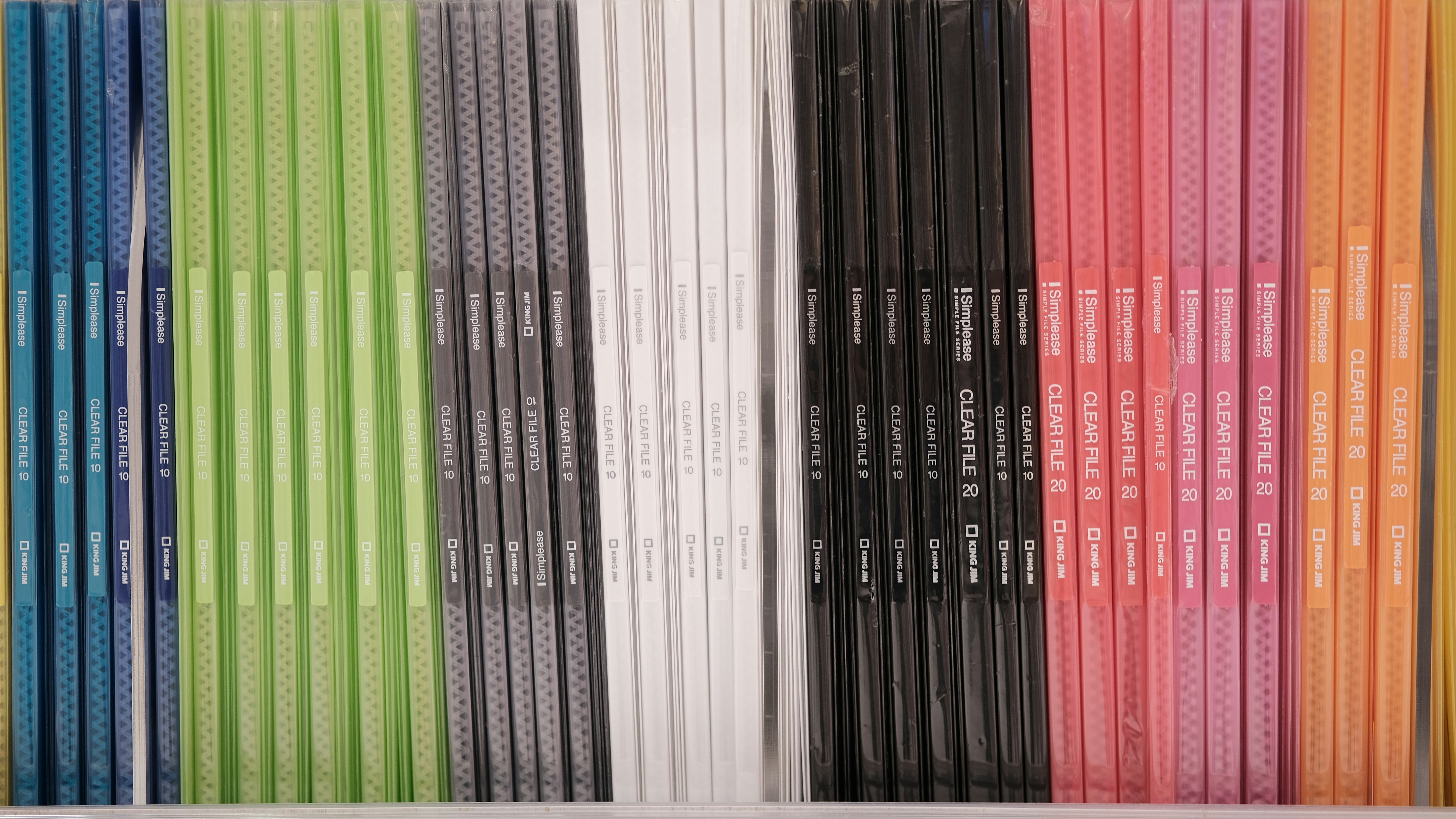 Spectrum in Spines: A Linear Gradient of Colorful Book Bindings